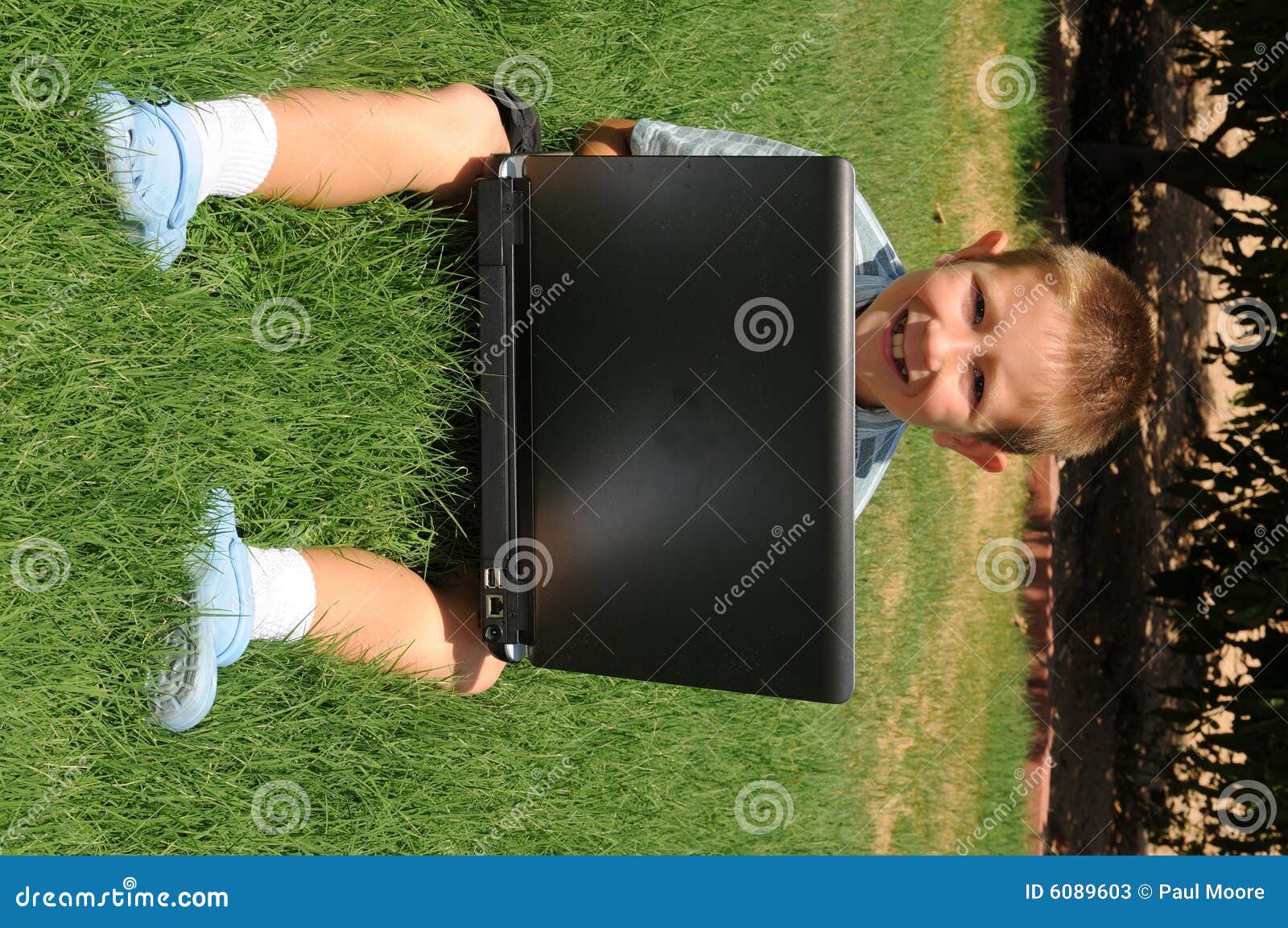 Boy with Laptop Computer stock image. Image of people - 6089603