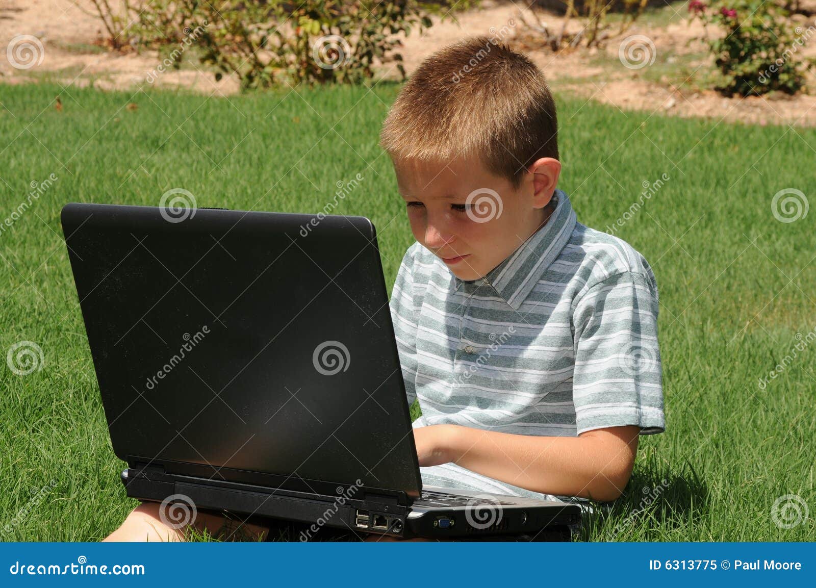 Boy with Laptop Computer stock image. Image of education - 6313775