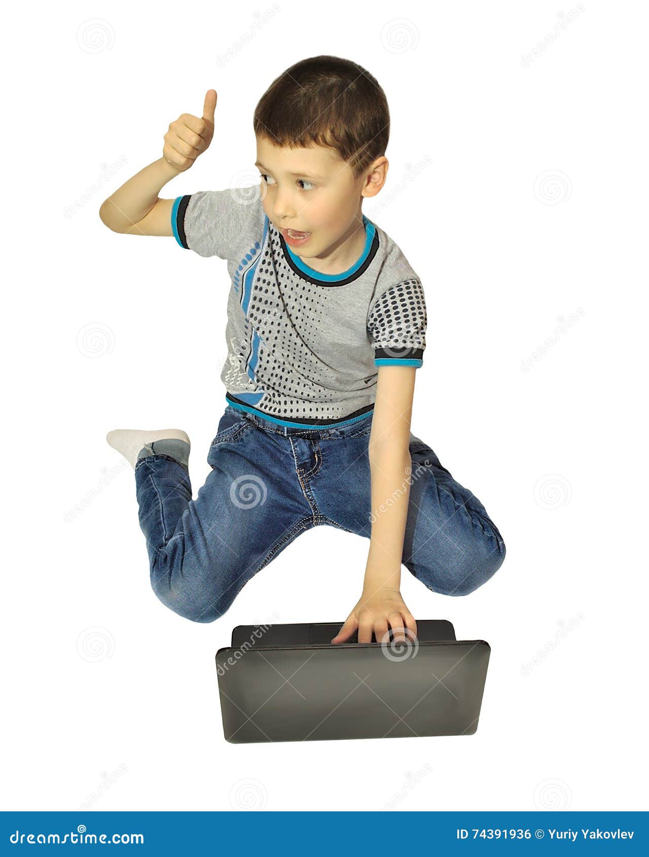 Boy with a Laptop Happy with the Game Stock Photo - Image of smile ...