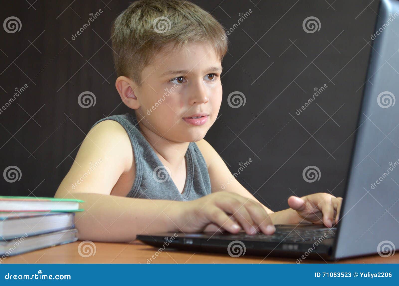 Boy with laptop stock image. Image of cute, development - 71083523