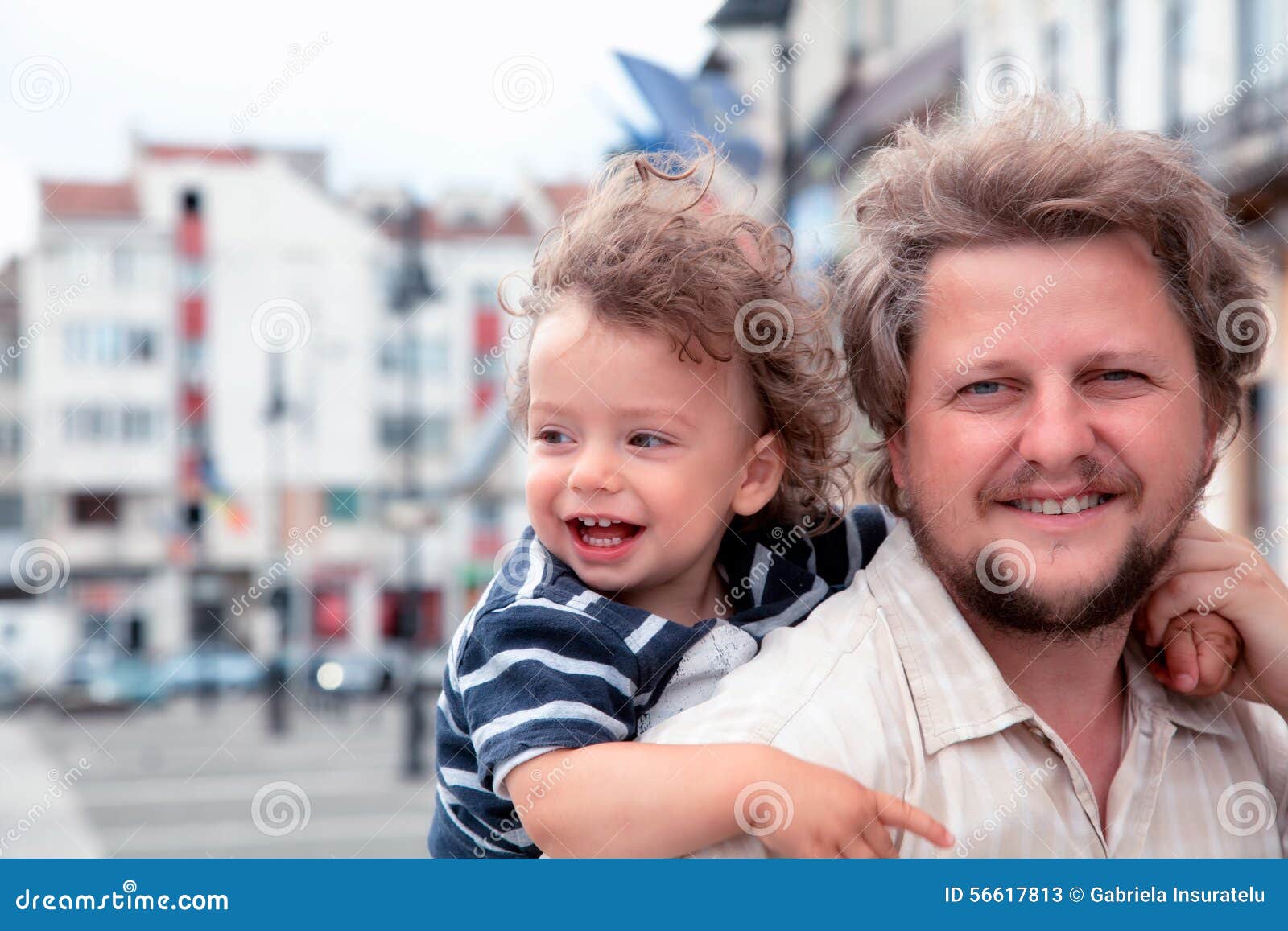 Boy laughing with daddy stock image. Image of child, childhood - 56617813