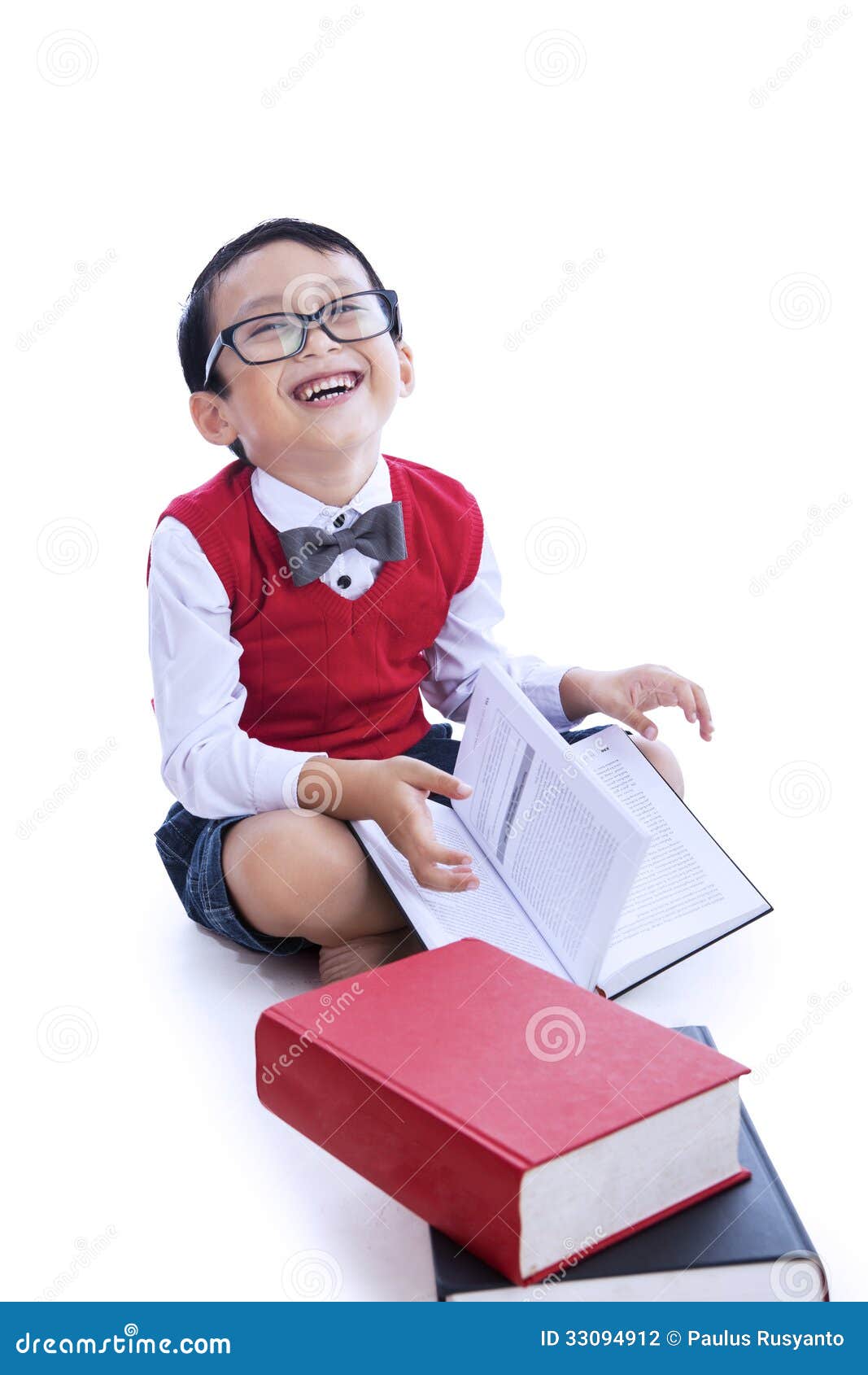 Boy Laughing Between Reading A Book Stock Photography | CartoonDealer ...