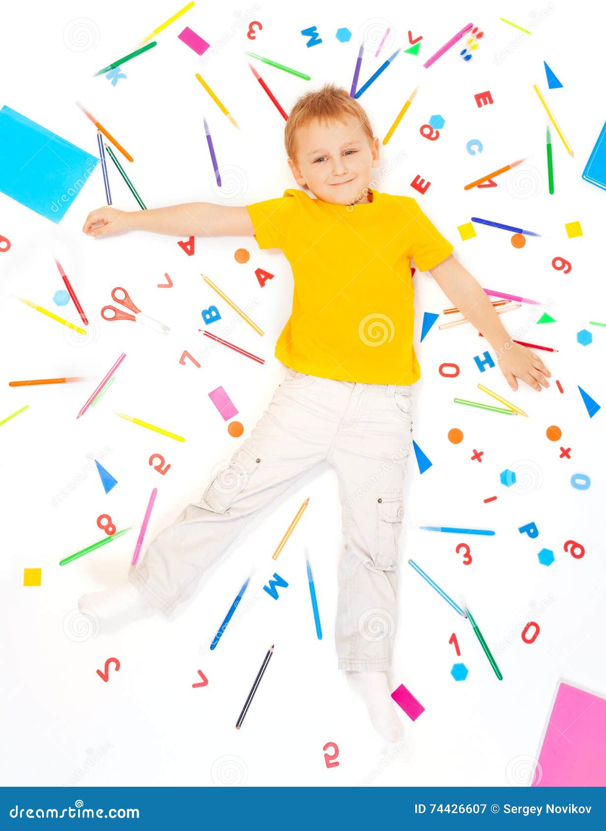 Boy Laying among Office Supply Objects Collection Stock Image - Image ...