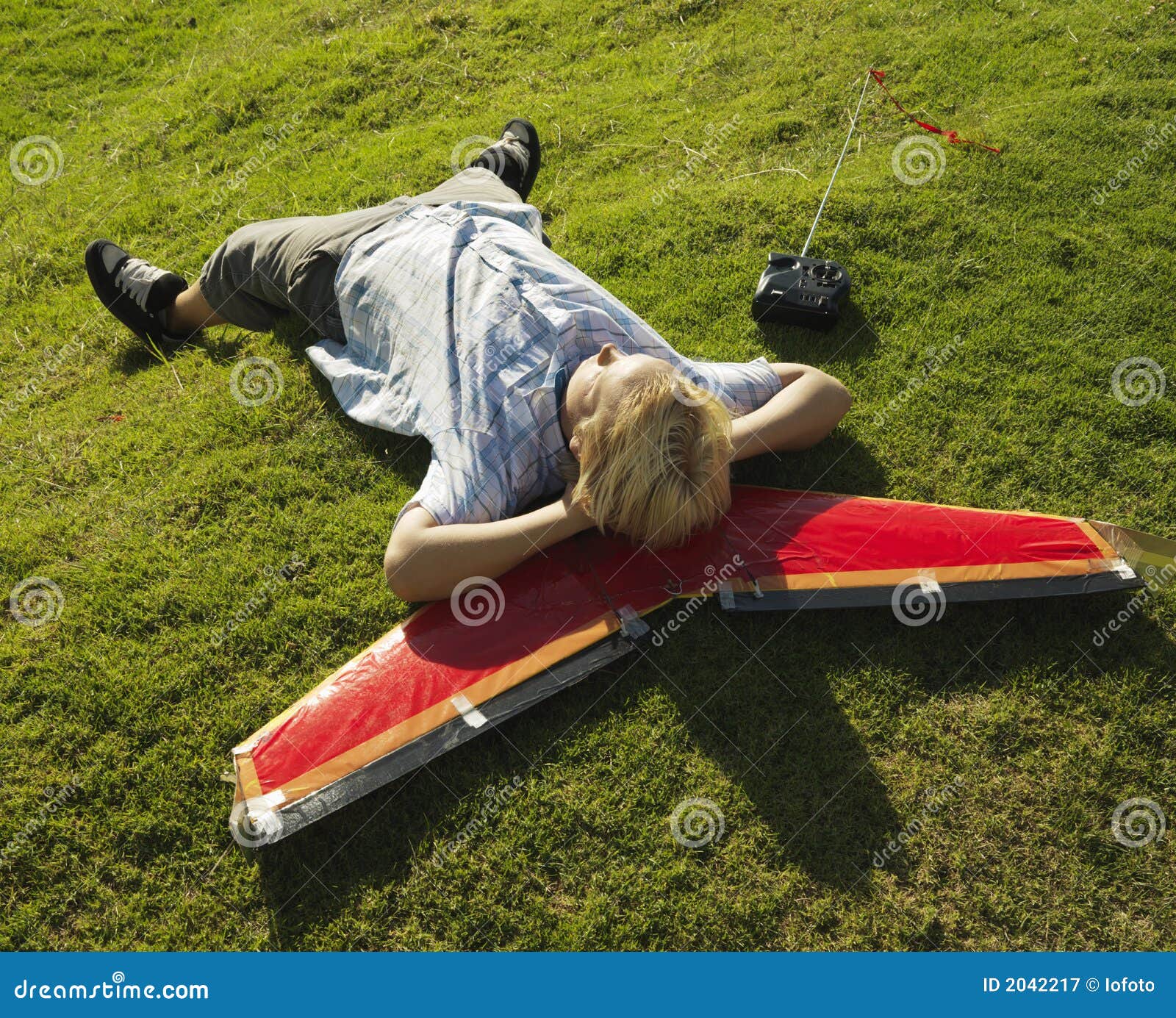 Boy Laying and Resting His Head on Airplane. Stock Image - Image of ...