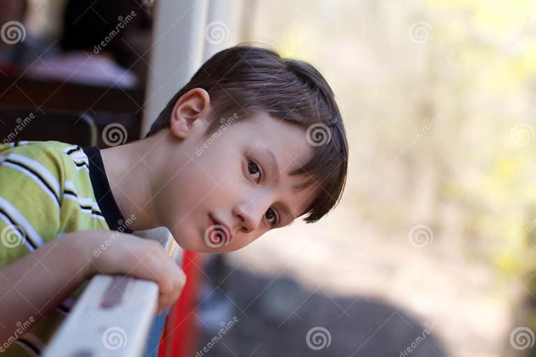 Boy lean out from window stock photo. Image of people - 30664466