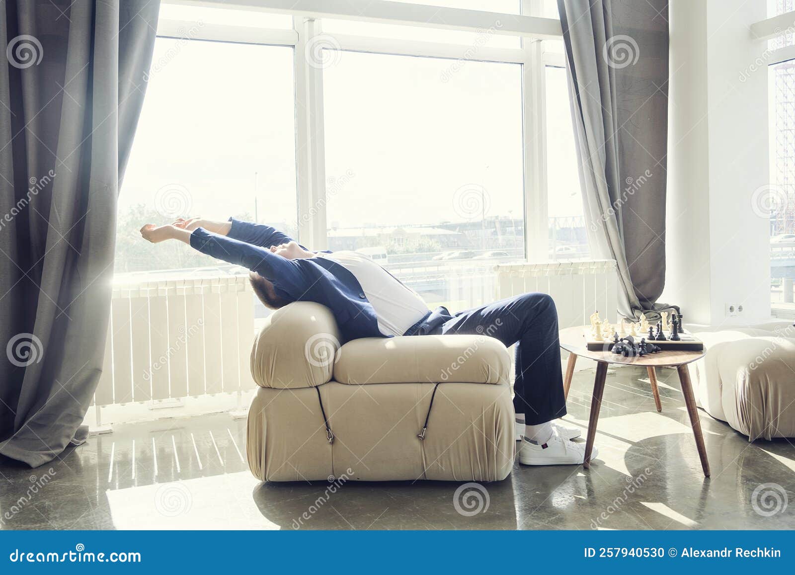 Boy Leaned Back in His Chair Resting after Playing Chess Stock Photo ...