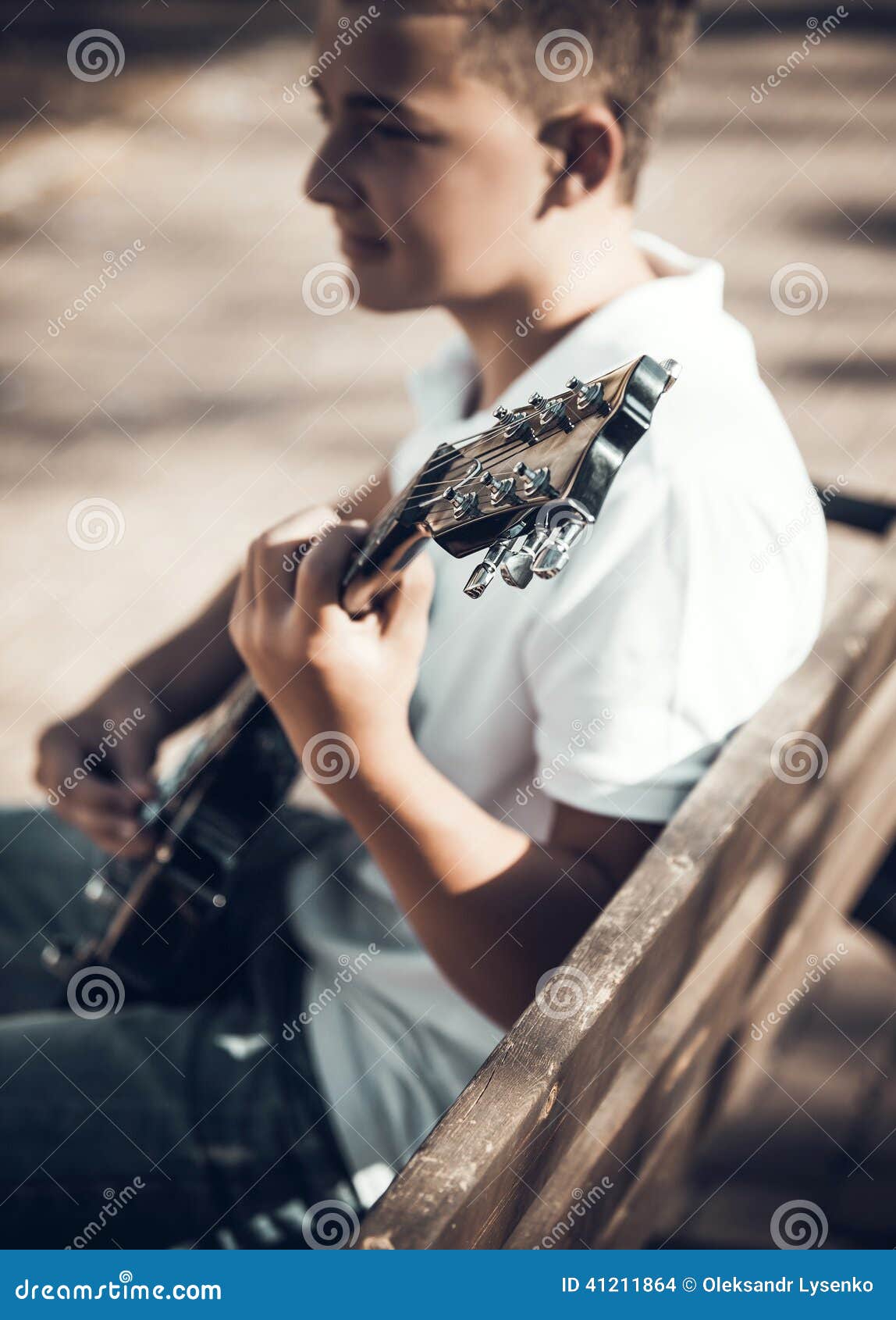 Boy Learning To Play Guitar Stock Photo - Image of song, guitar: 41211864
