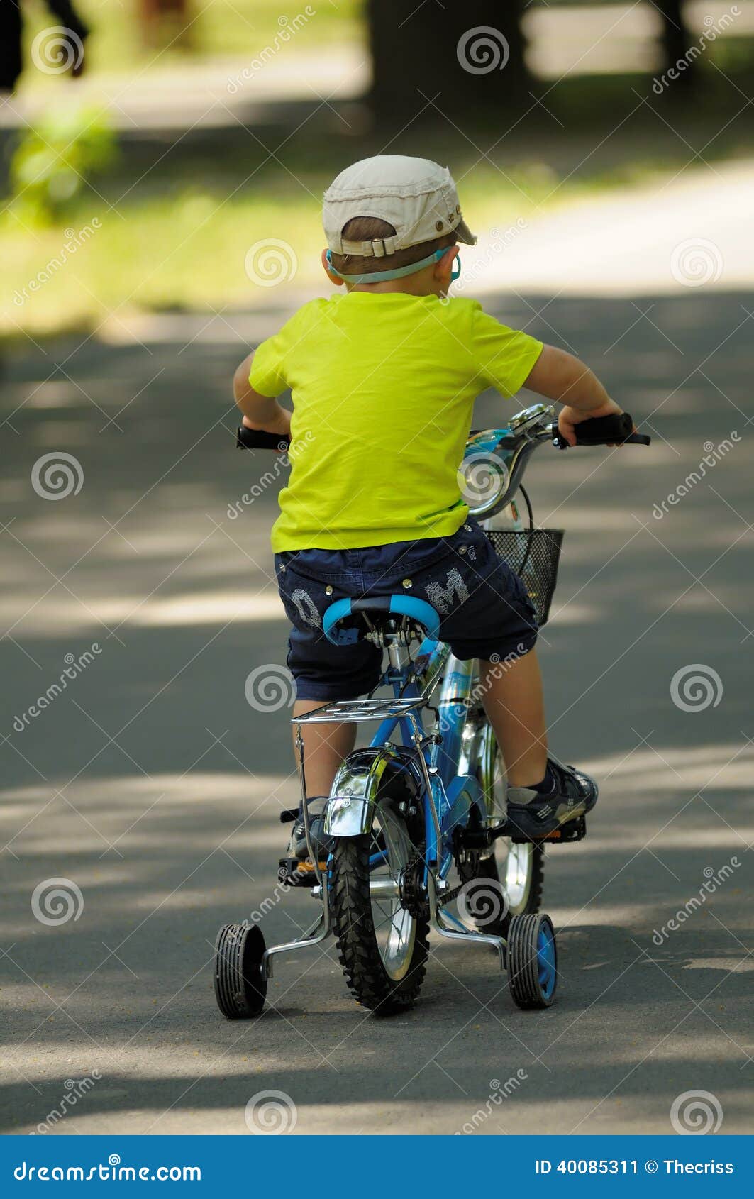 Boy learning to ride bike stock image. Image of male - 40085311