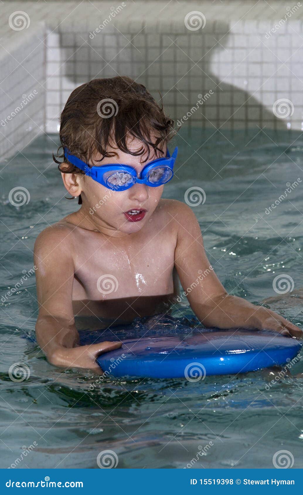 Boy learning to swim stock photo. Image of swimming, swim - 15519398