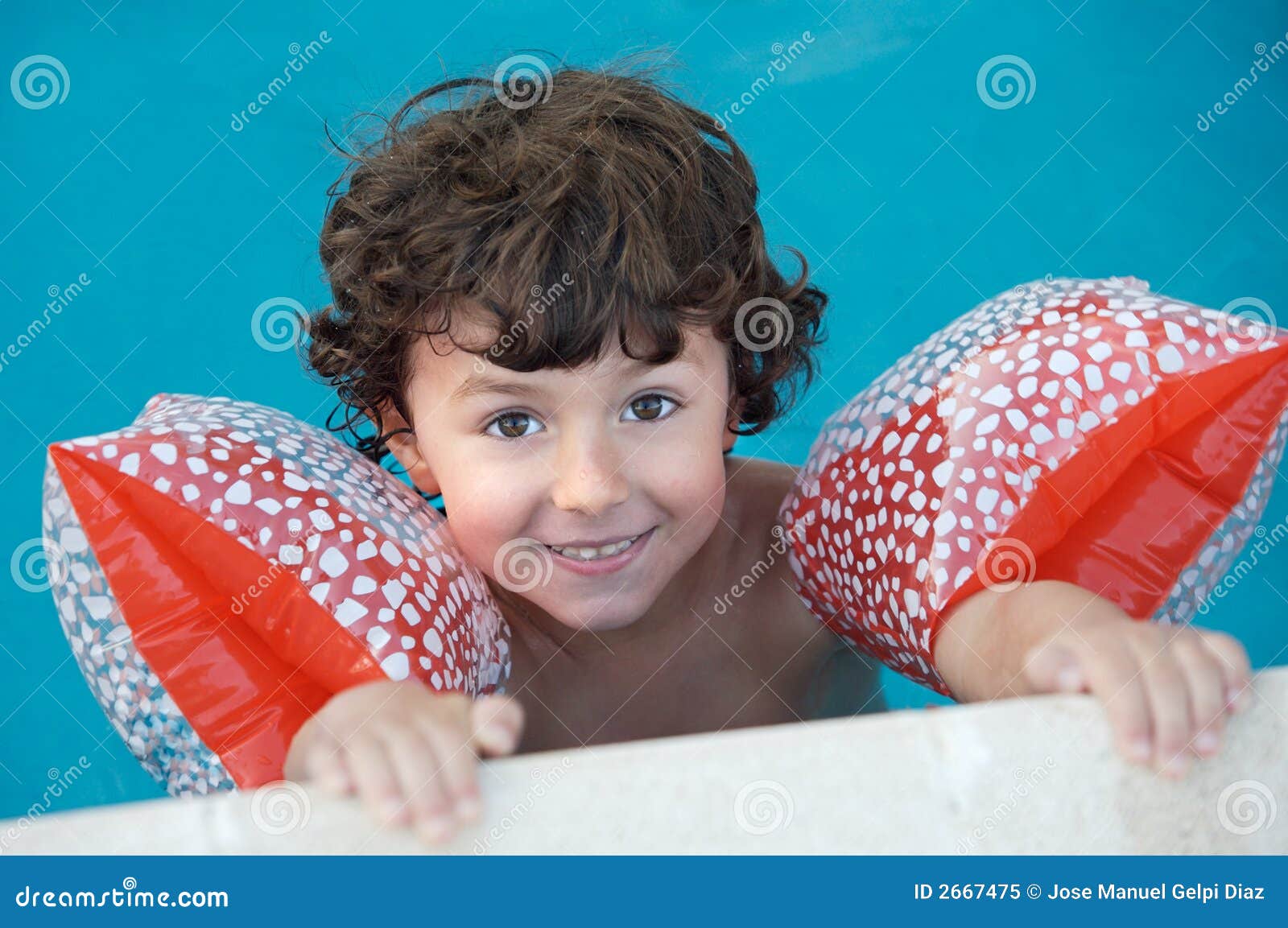 Boy learning to swim stock image. Image of water, playing - 2667475