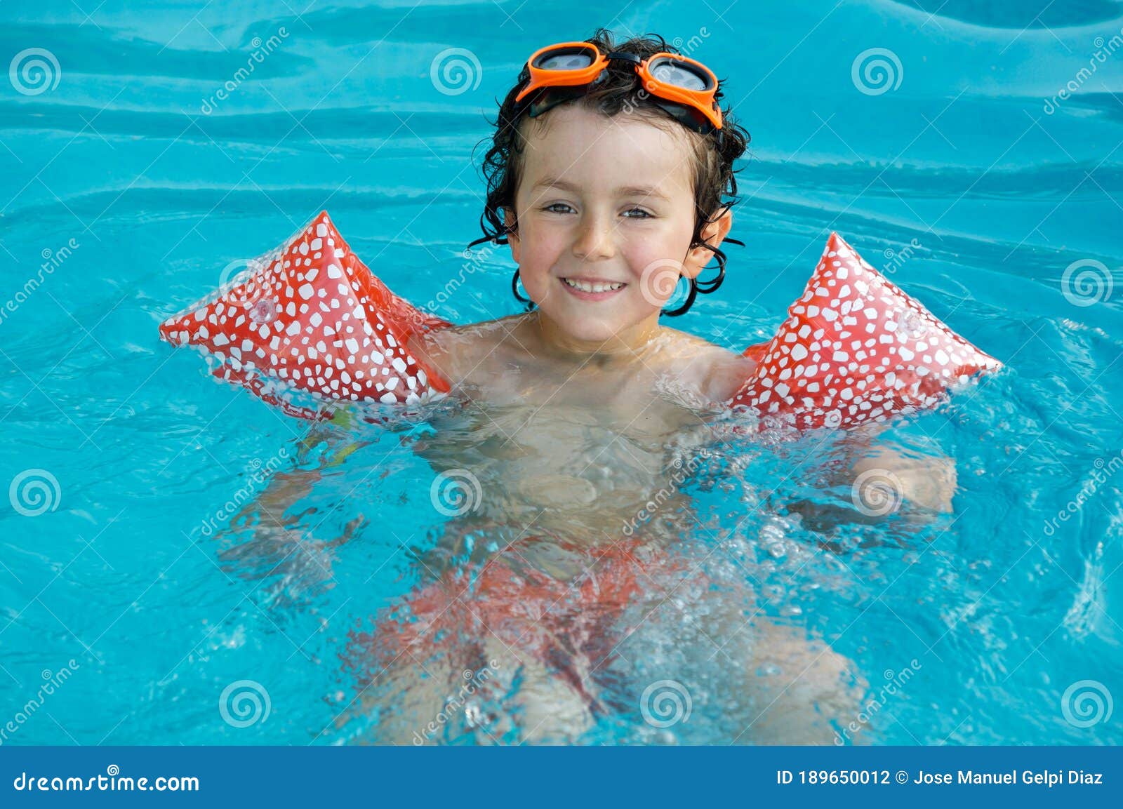 Boy learning to swim stock photo. Image of concept, people - 189650012