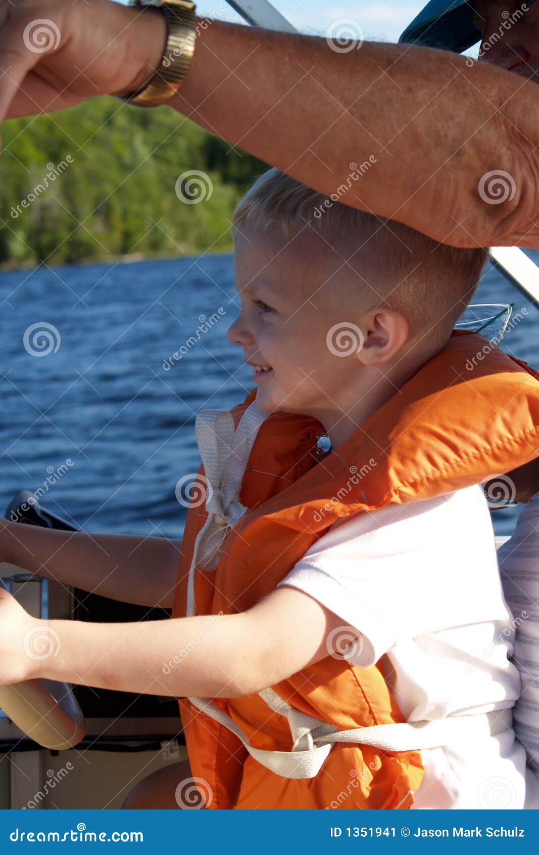 Boy Learns To Drive the Boat Stock Image - Image of little, innocent ...