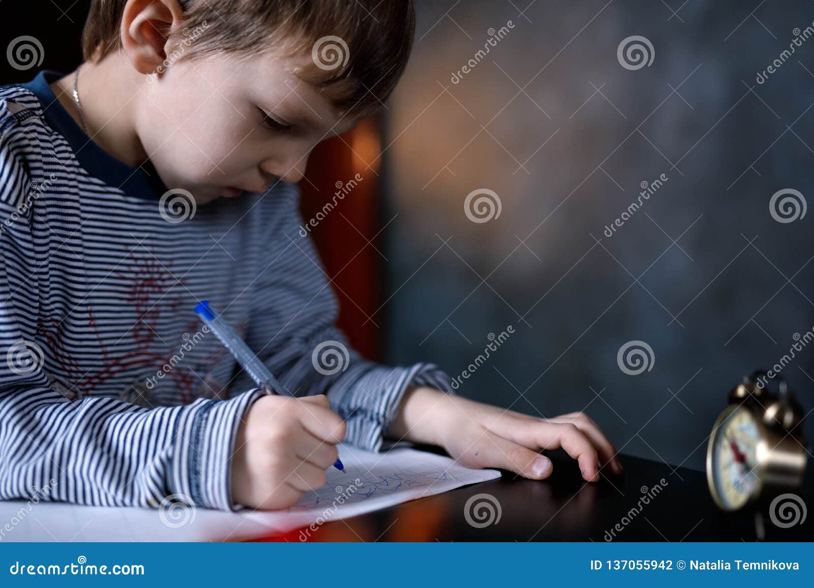Boy learns to write stock photo. Image of hands, activity - 137055942