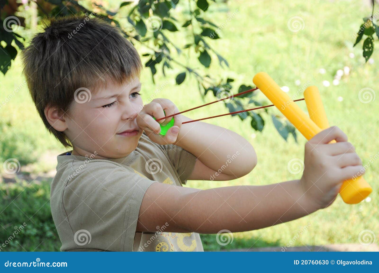 A Boy with a Left-handed Catapult Stock Photo - Image of little ...