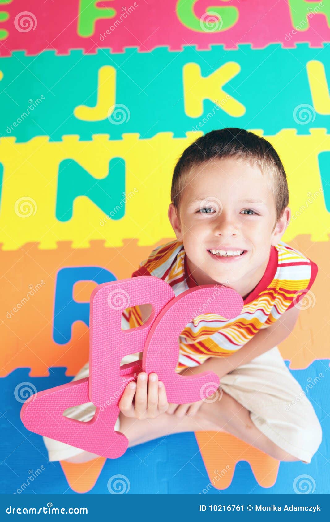 Boy with letters stock image. Image of preschool, text - 10216761