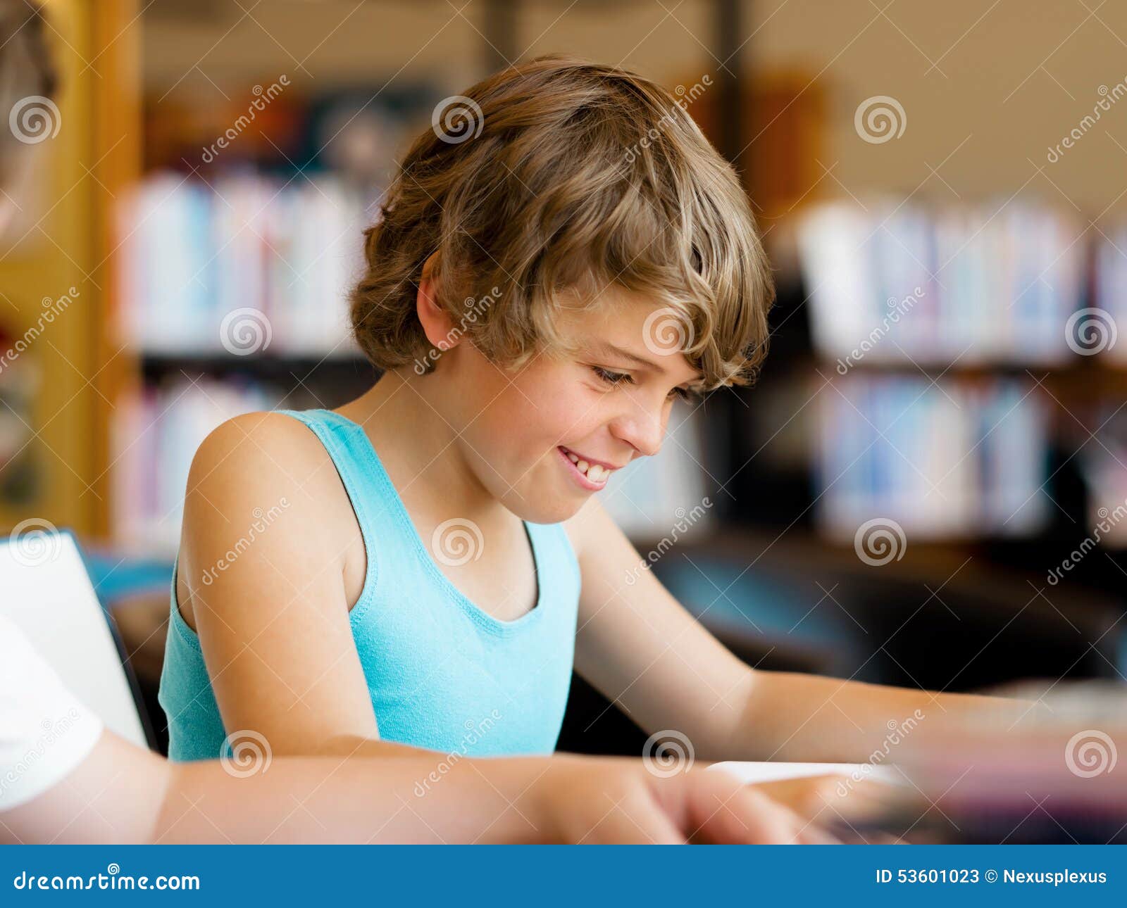 Boy in library stock image. Image of friend, project - 53601023