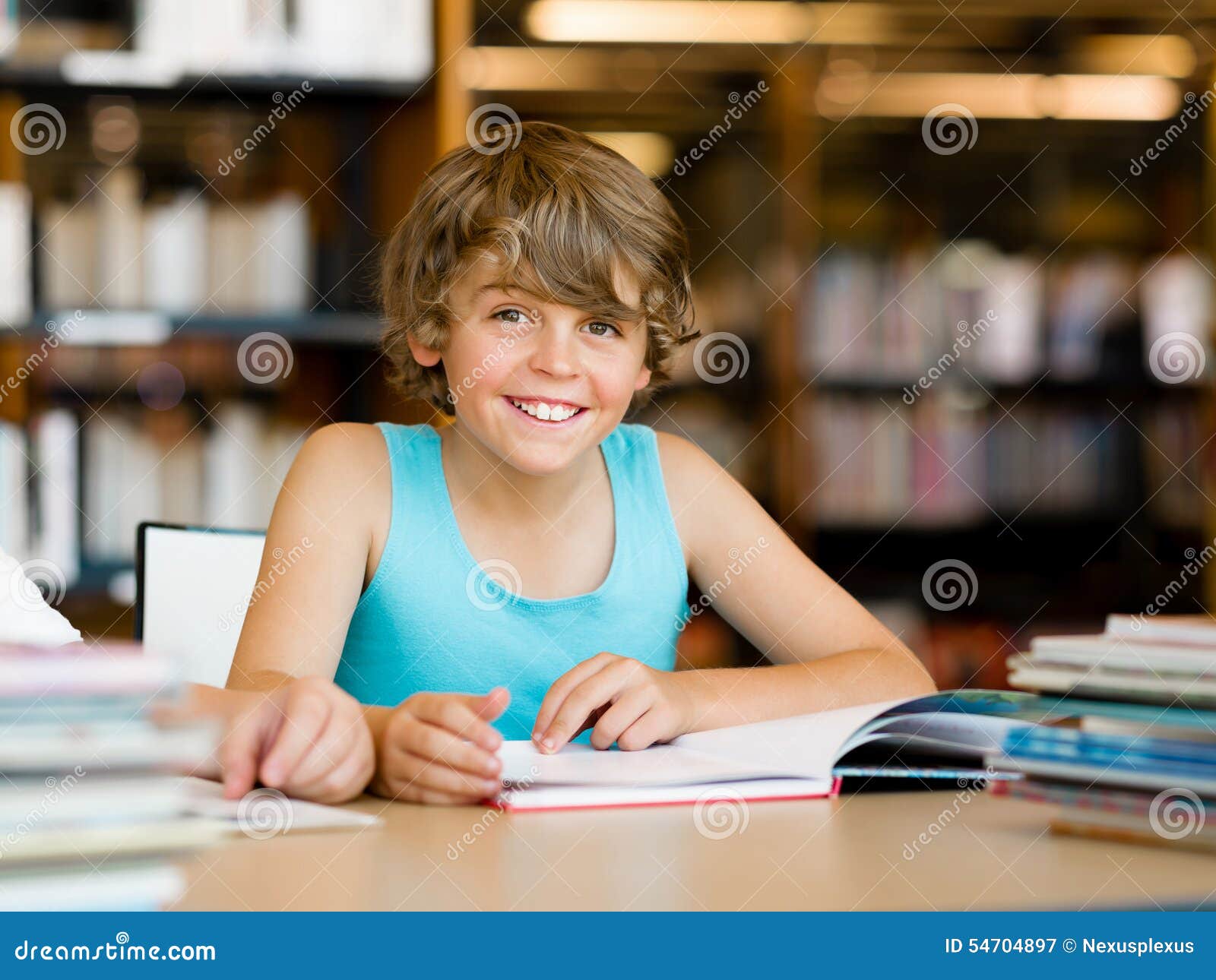 Boy in library stock image. Image of elementary, portrait - 54704897