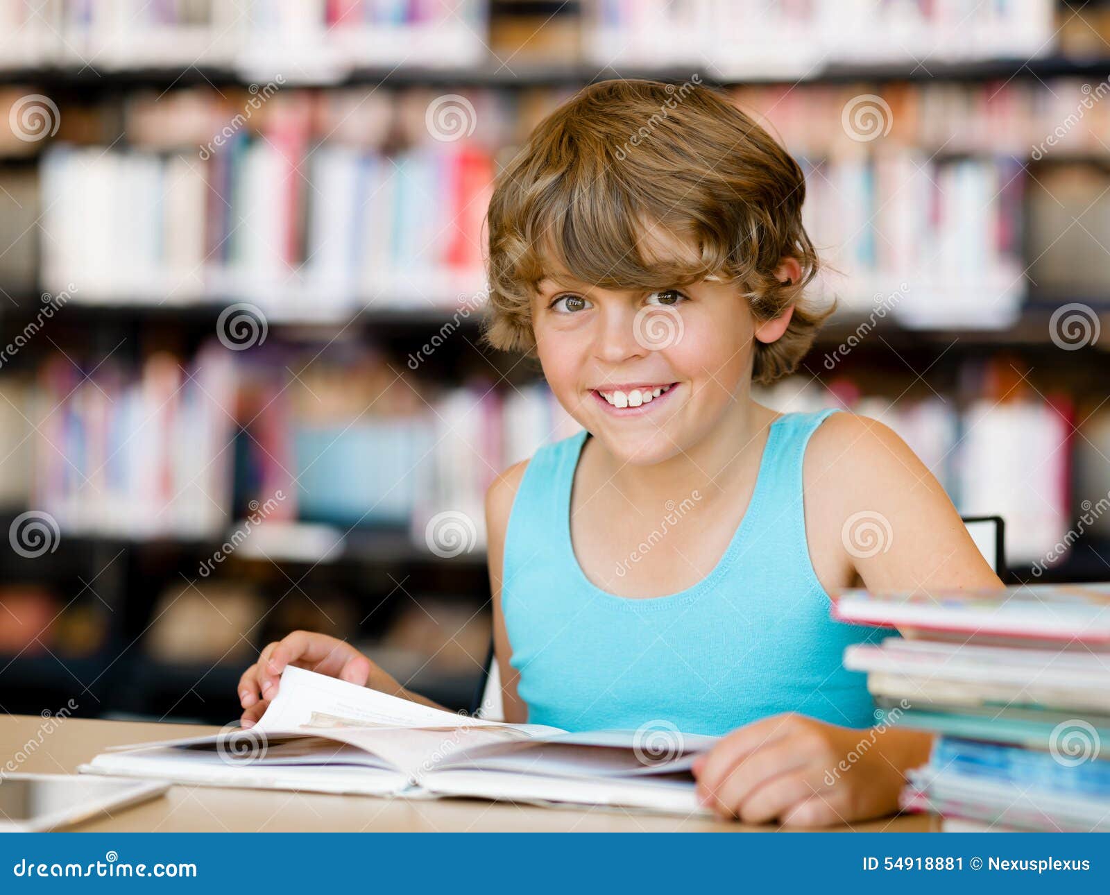 Boy in library stock image. Image of stack, literature - 54918881
