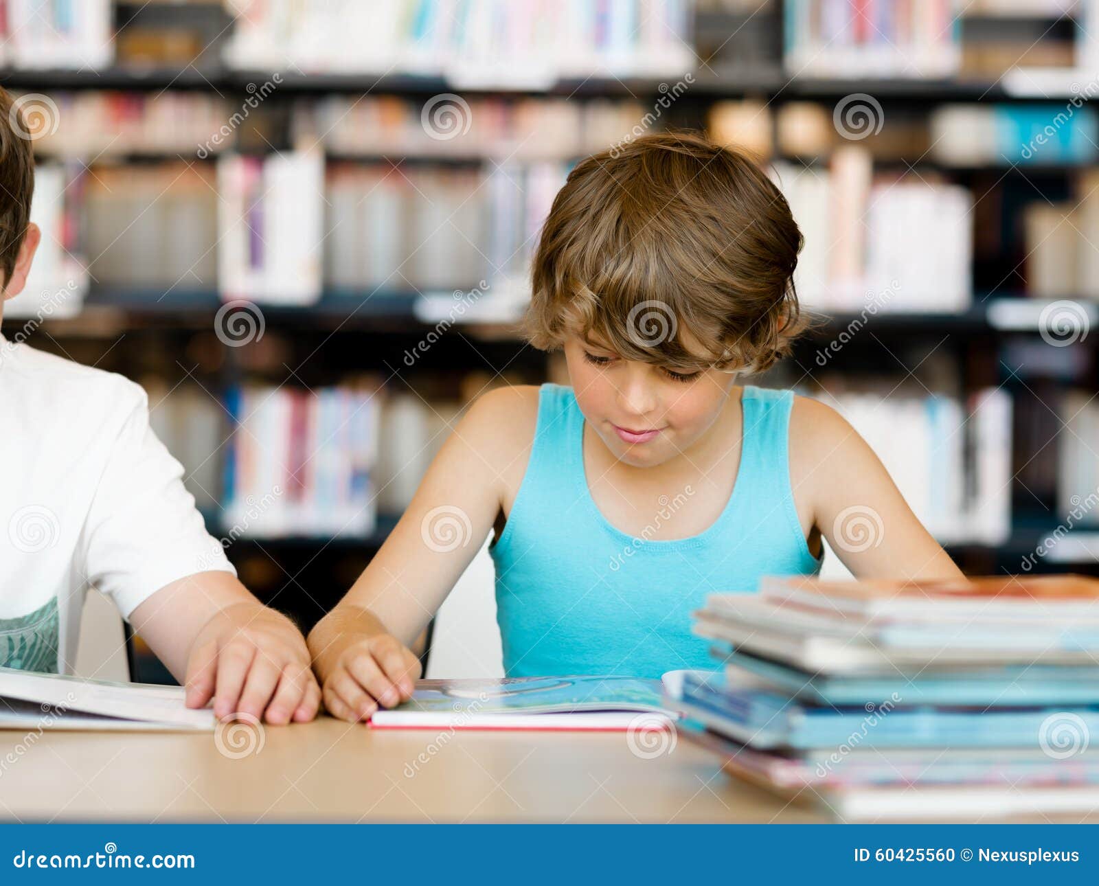 Boy in library stock photo. Image of male, learn, casual - 60425560