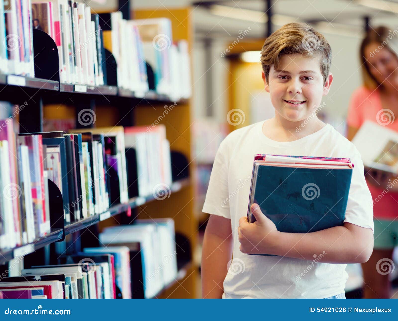 Boy in library stock photo. Image of student, elementary - 54921028