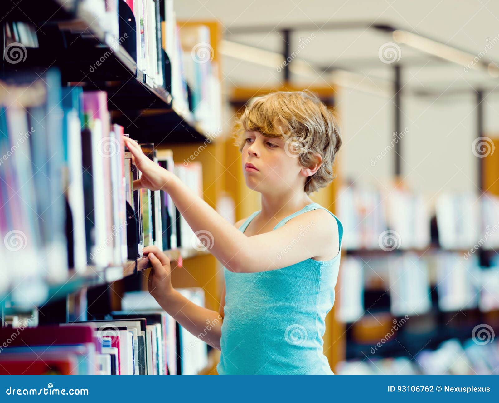 Boy in library stock photo. Image of smile, people, education - 93106762