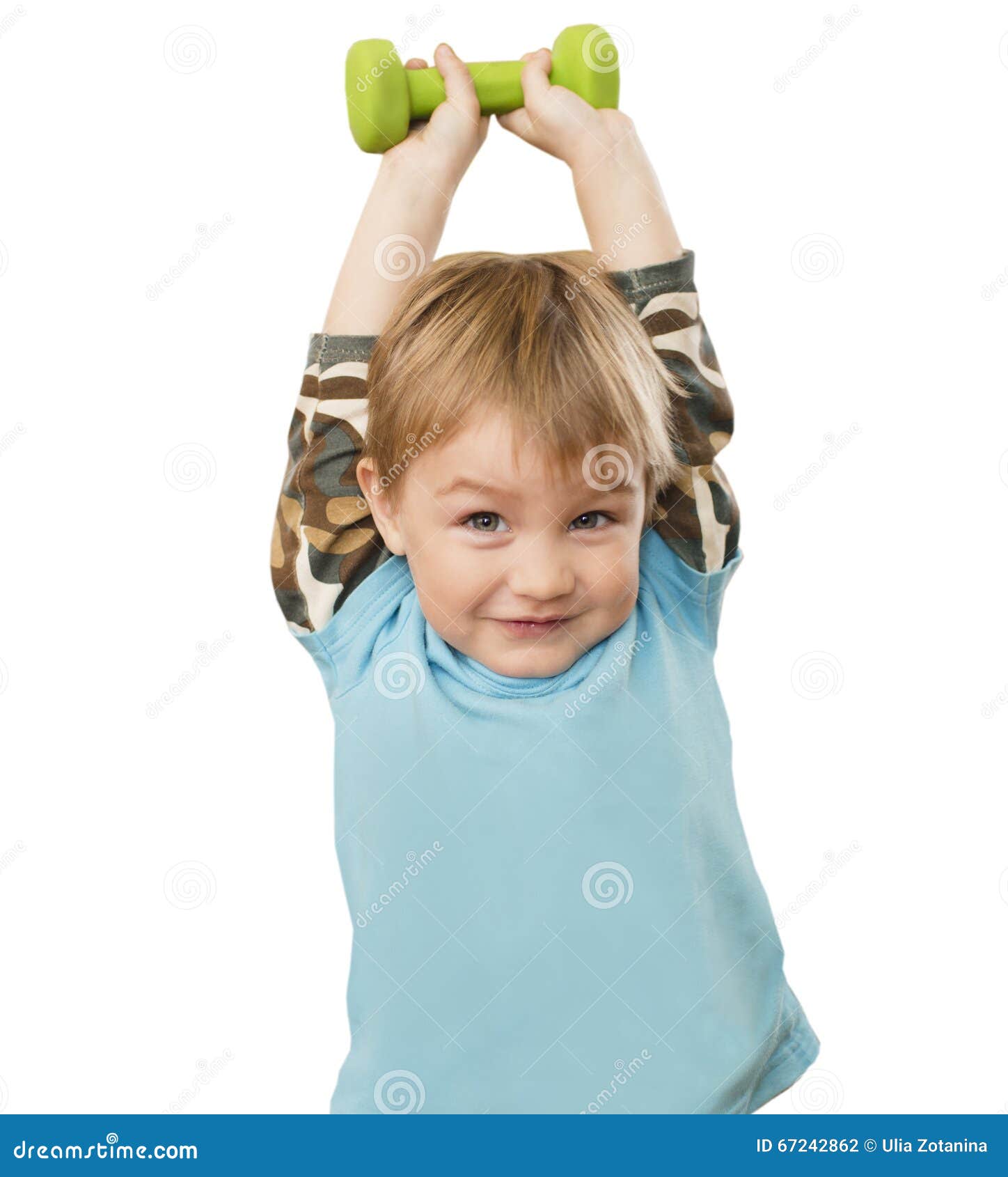 The boy lifts a dumbbell stock photo. Image of cute, indoors - 67242862