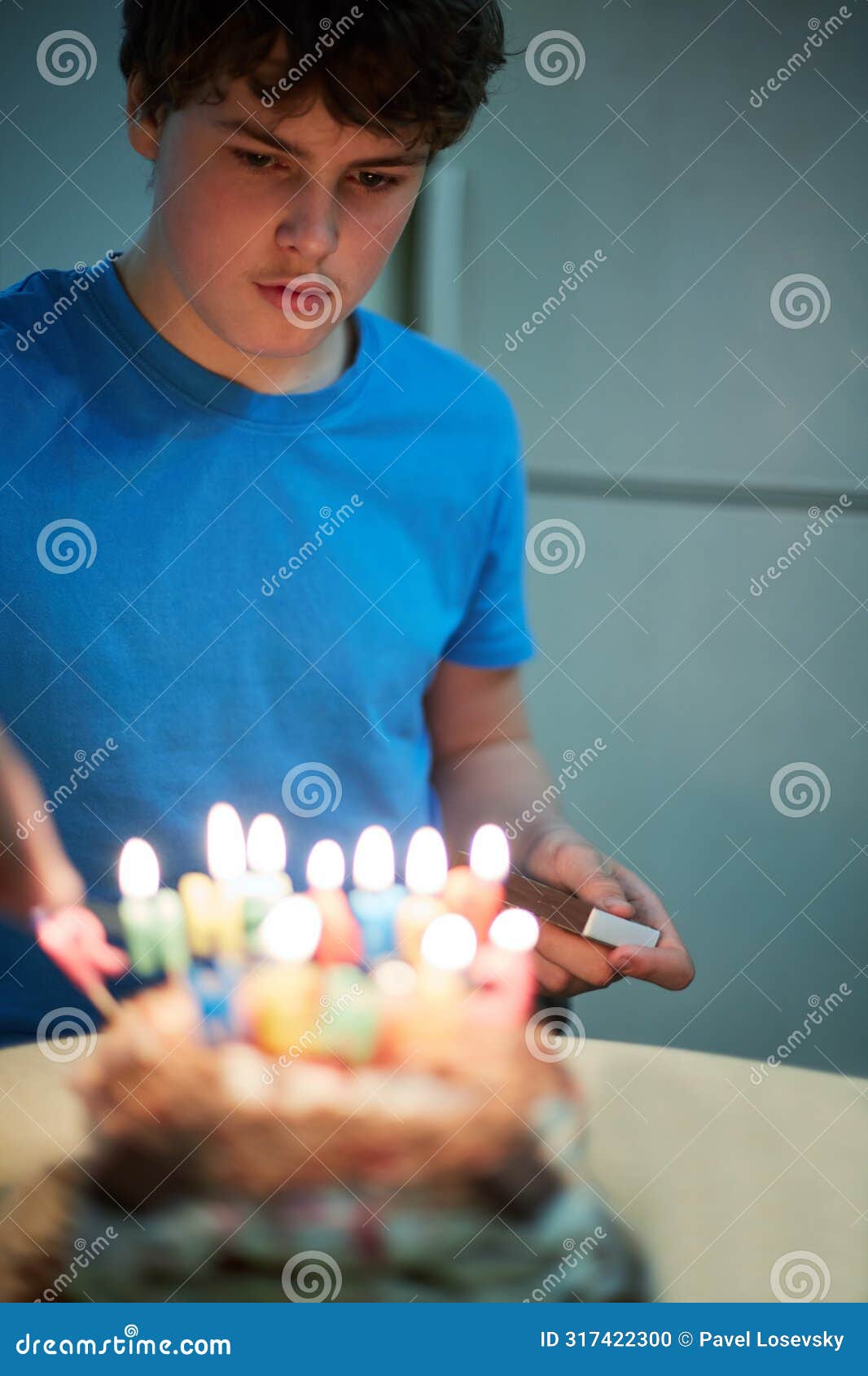 Boy Lights Candles on a Birthday Stock Photo - Image of dark, color ...