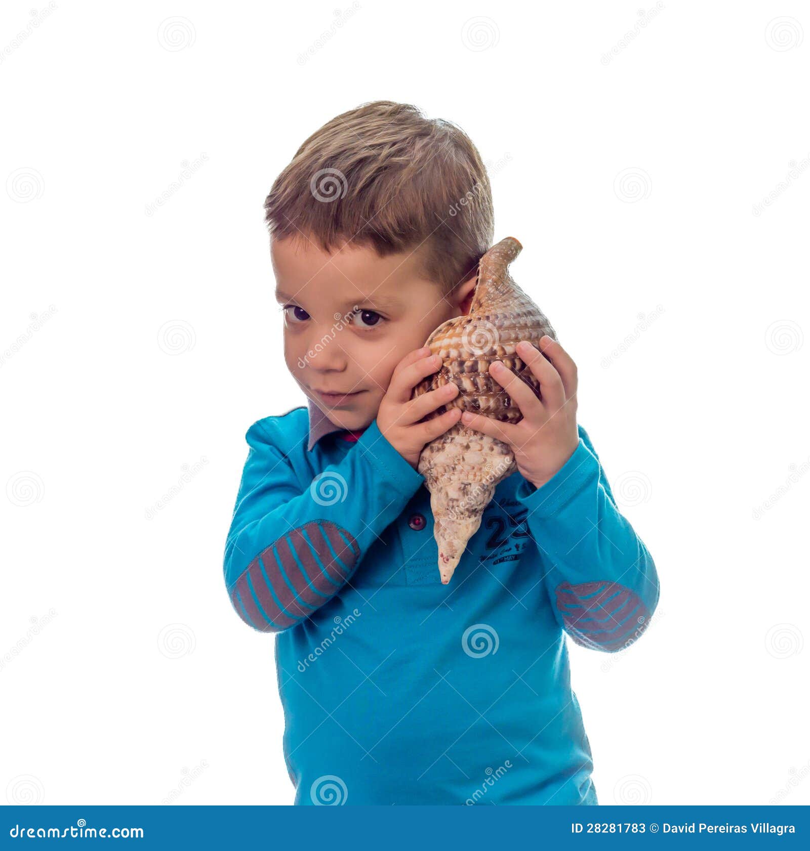 Boy Listening To the Sea through a Seashell Stock Image - Image of ...