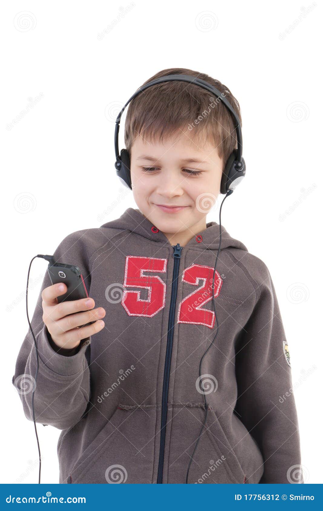 The boy listens to music stock photo. Image of phones - 17756312