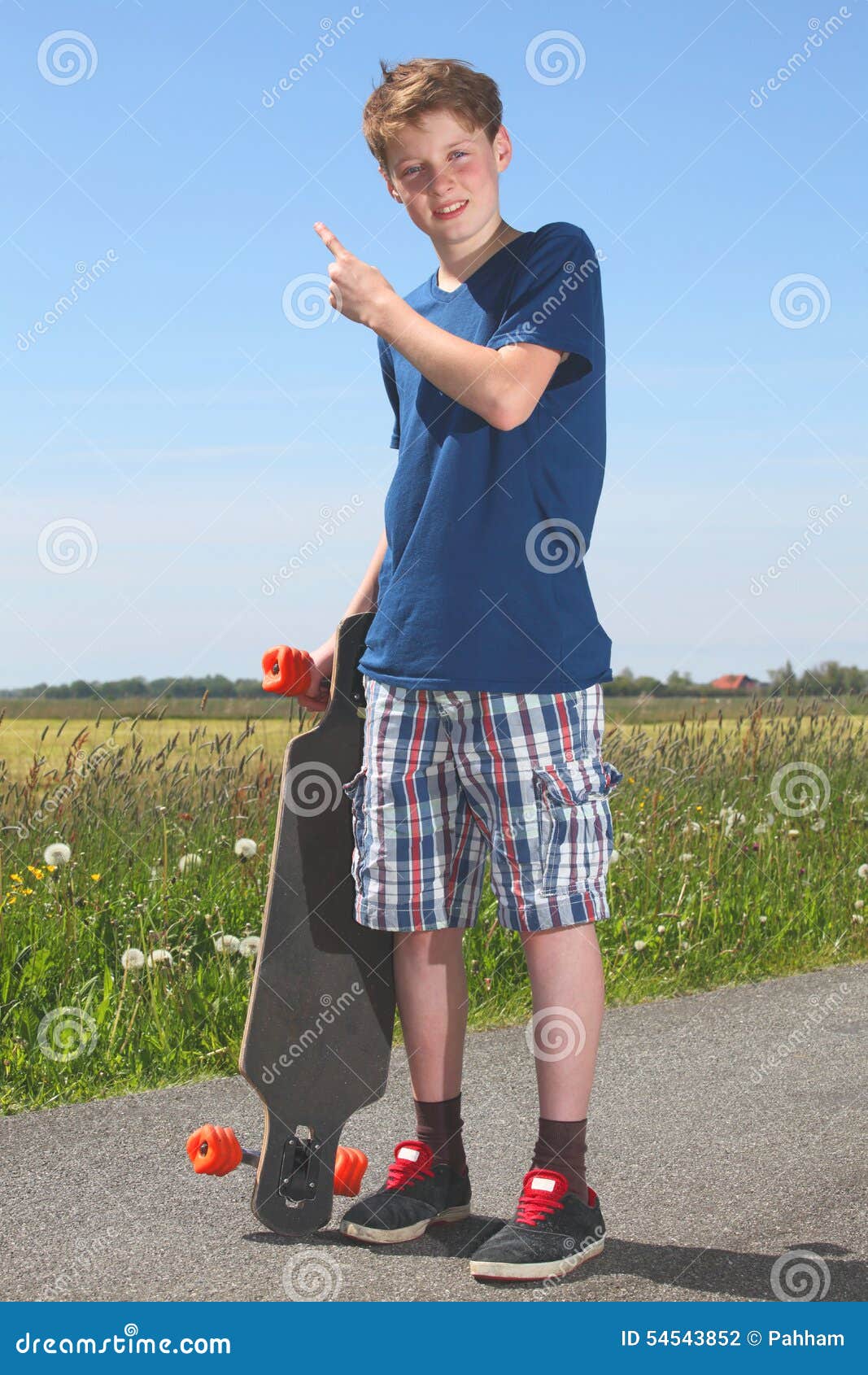 Boy with longboard stock photo. Image of rolling, skating - 54543852