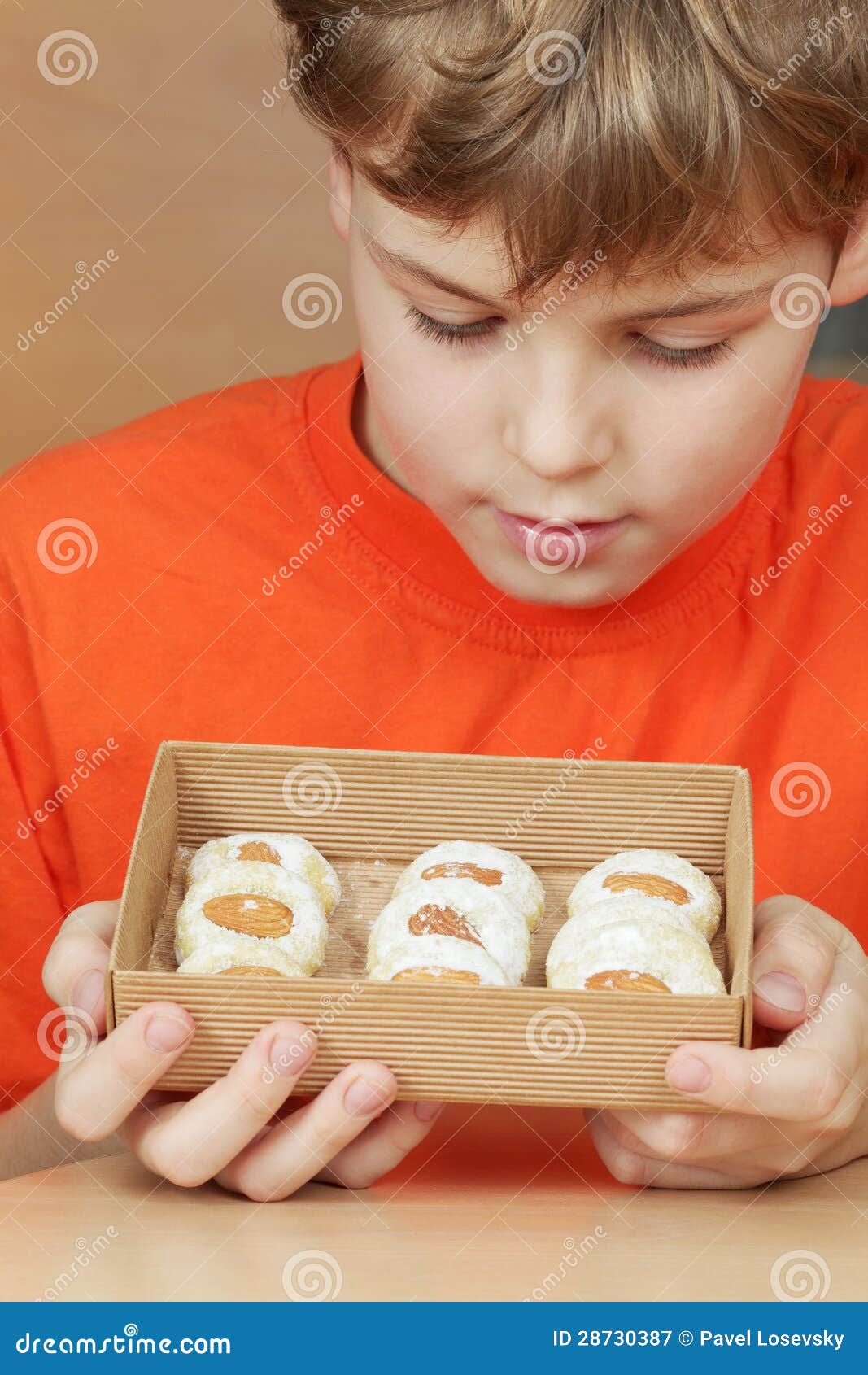 Boy Look at Open Box of Corrugated Cardboard with Cookies Stock Image ...