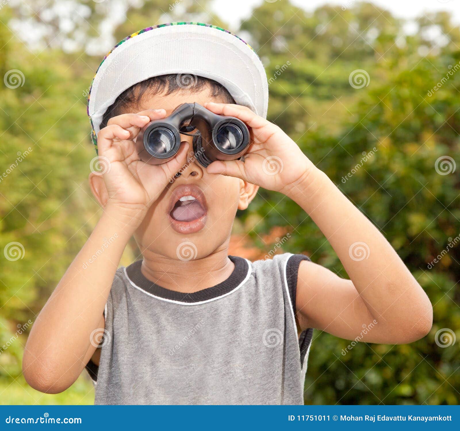 Boy Looking through Binoculars Stock Image - Image of sight, look: 11751011
