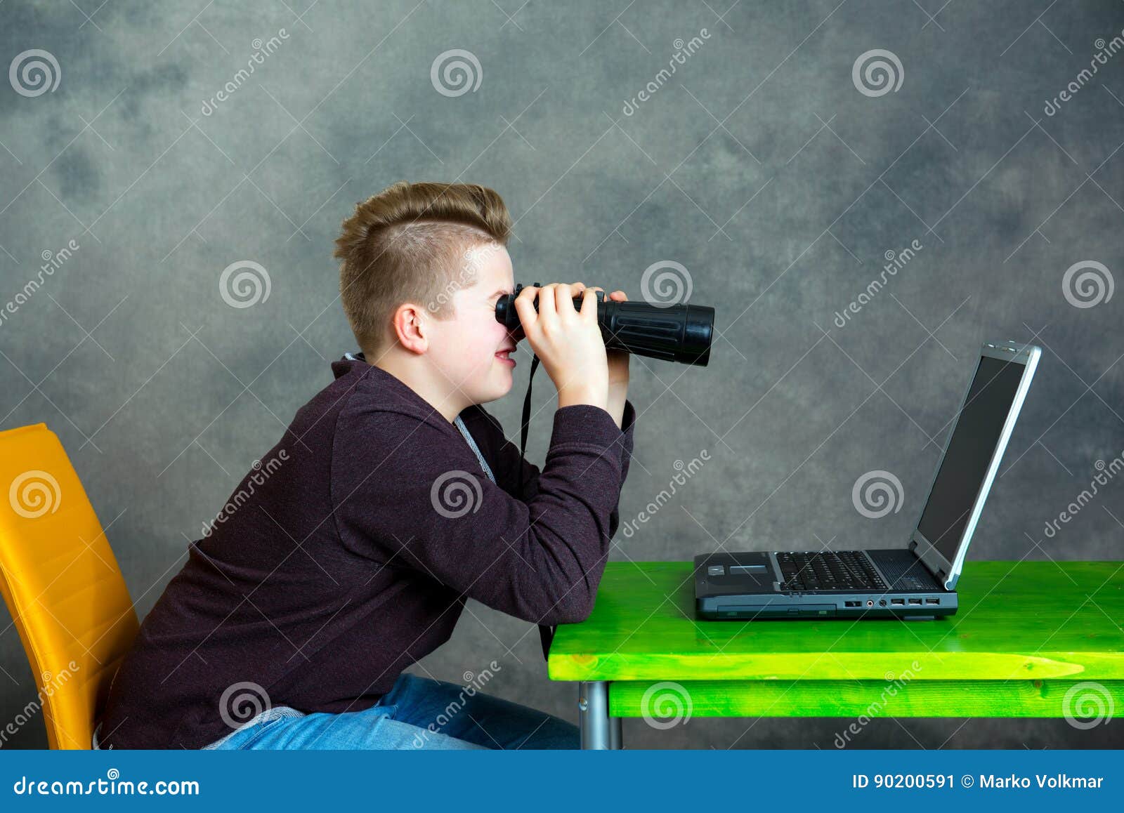 Boy Looking through a Binoculars at the Computer Stock Image - Image of ...