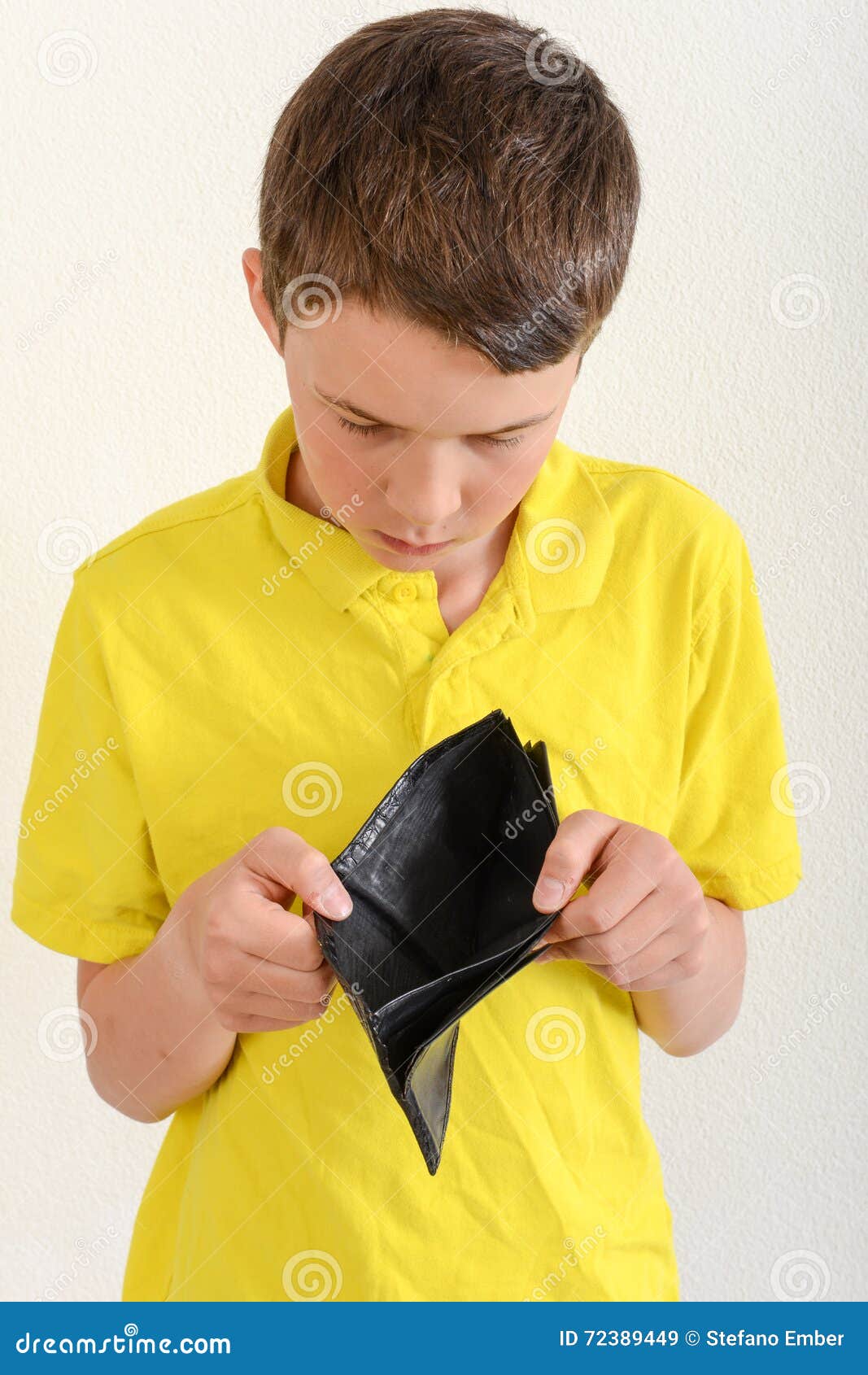 Boy Looking at an Empty Wallet Stock Image - Image of euro, empty: 72389449