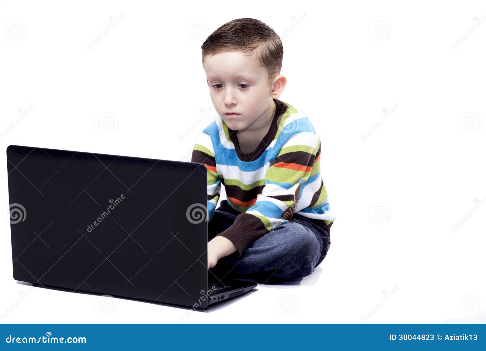 Boy playing with a laptop stock image. Image of childhood - 30044823