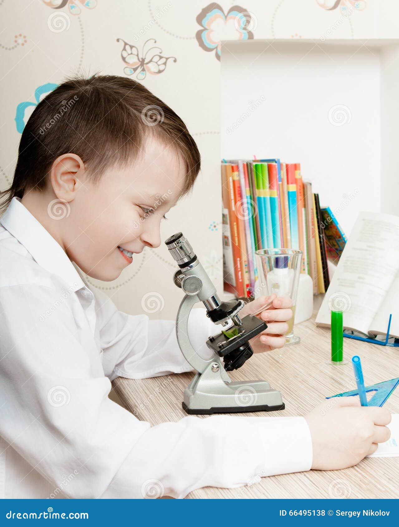 Boy Looking through a Microscope Stock Photo - Image of looking, high ...