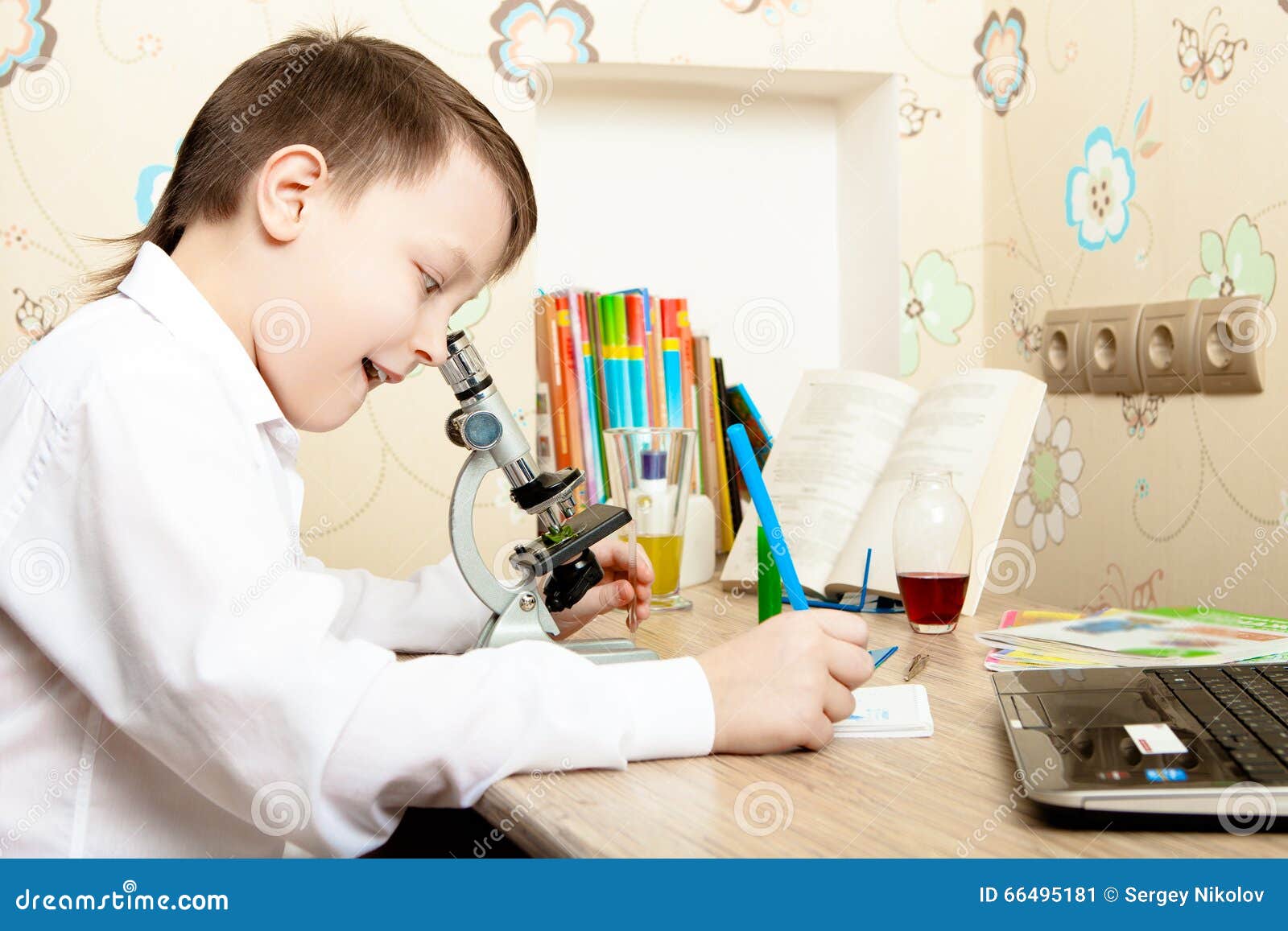 Boy Looking through a Microscope Stock Image - Image of science, learn ...