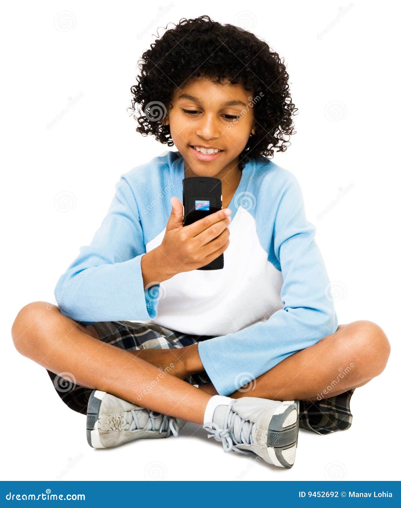 Boy Looking at Mobile Phone Stock Photo - Image of isolated, networking ...