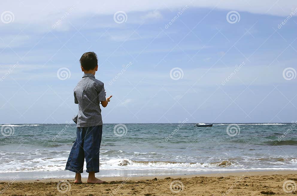Boy Looking at the Ocean stock image. Image of vista, view - 129151
