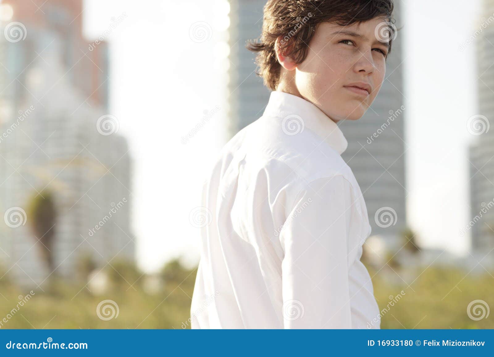 Boy Looking Over His Shoulder Stock Photo - Image of twelve, shoulder ...