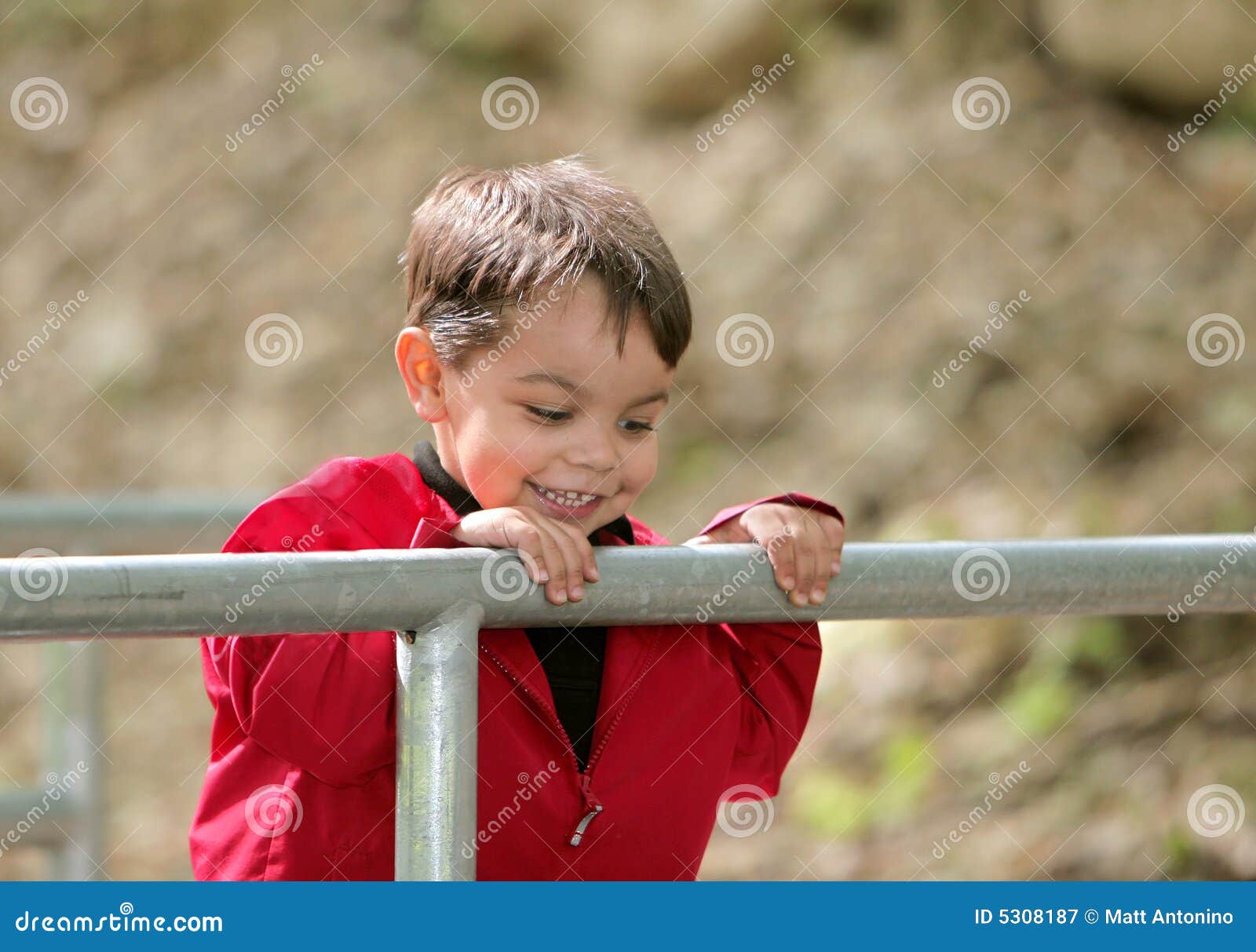 Boy Looking Over a Railing at a Bridge Stock Image - Image of river ...