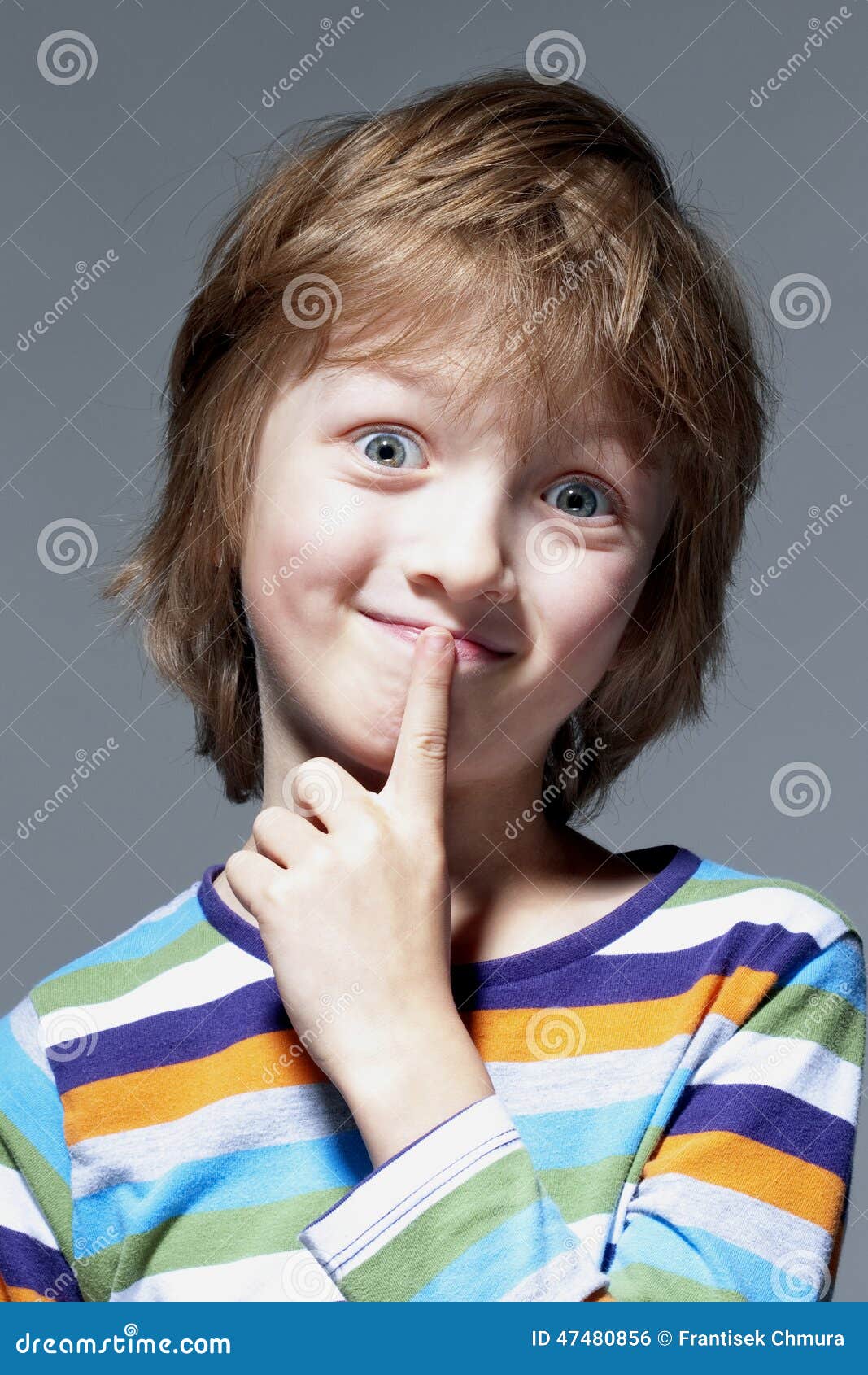 Boy Looking Thinking, Finger on His Mouth Stock Photo - Image of blond ...