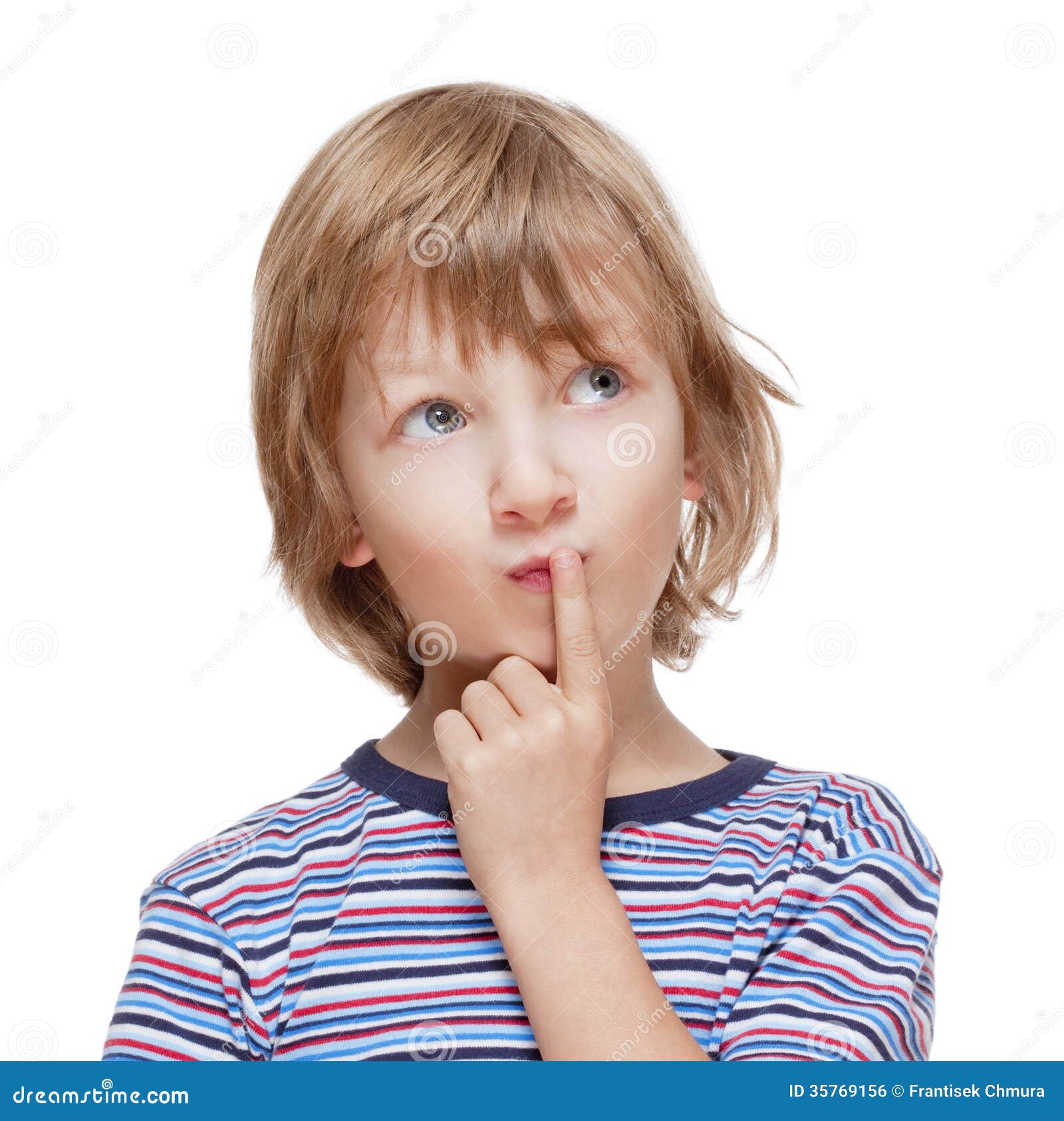 Boy Looking Up Thinking, Finger on His Mouth Stock Photo - Image of ...