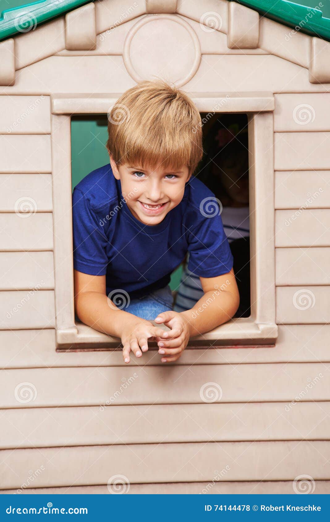 Boy Looking through Window in Playhouse Stock Photo - Image of play ...