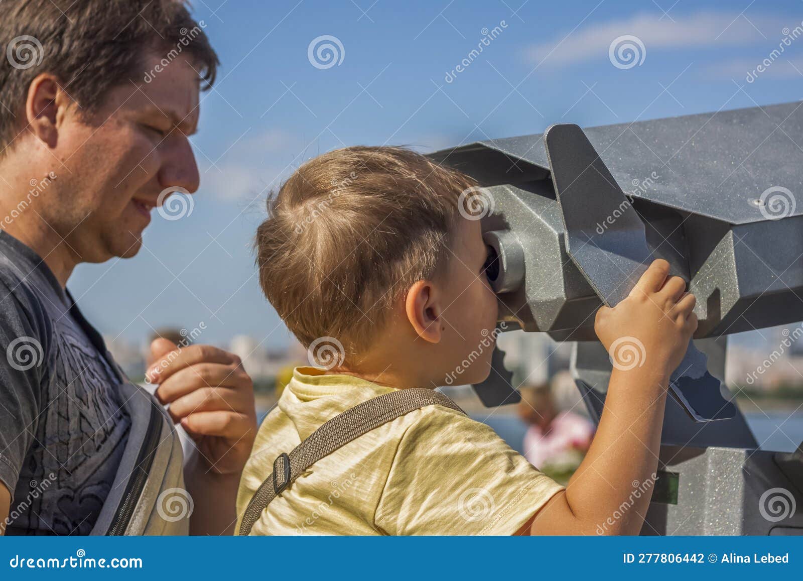 The Boy Looks through Binoculars from the Observation Deck. Journey ...