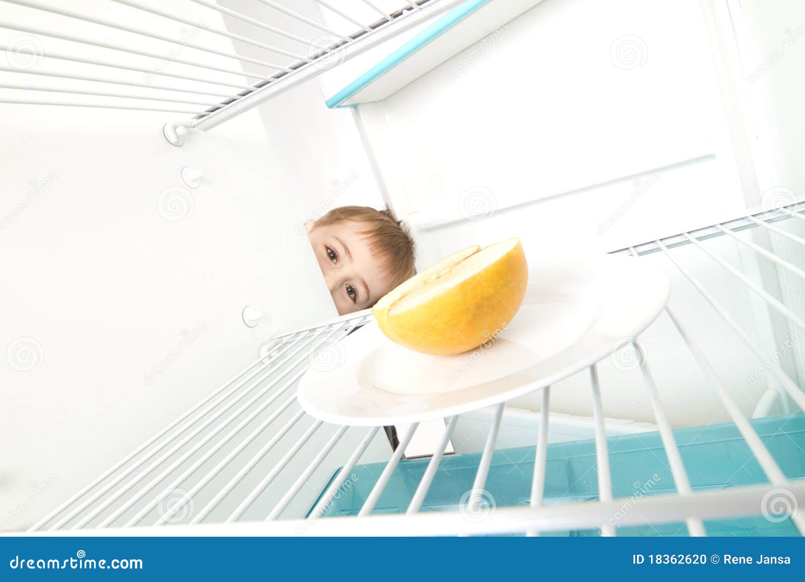 Boy Looks Empty Refrigerator Stock Photo - Image of peering, shelves ...