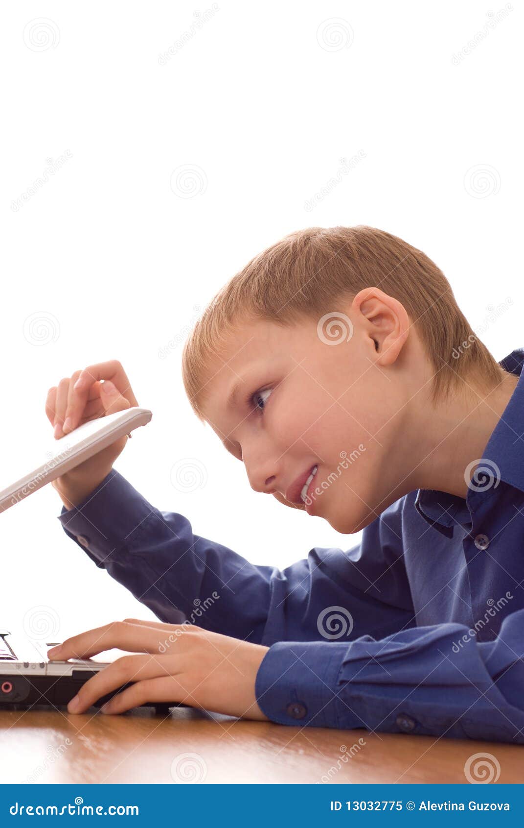 Boy looks into the laptop stock image. Image of male - 13032775
