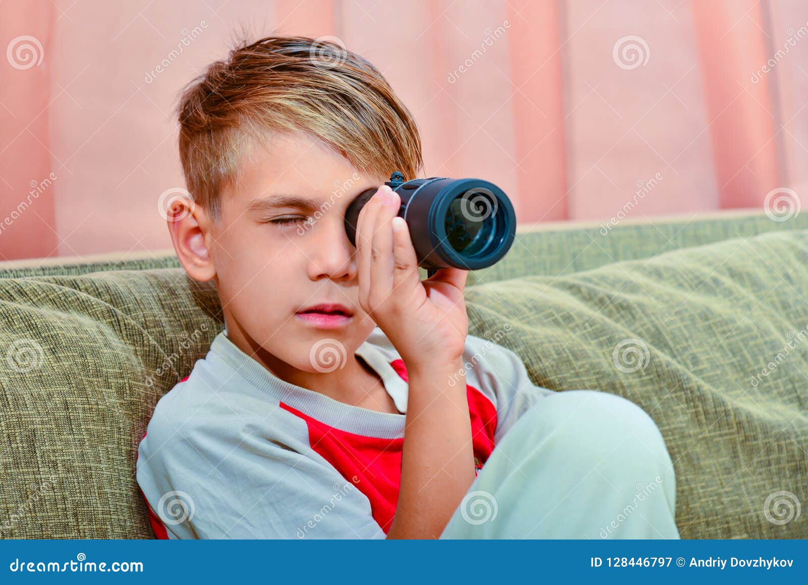 The Boy Looks in a Monocle. Stock Image - Image of infant, male: 128446797