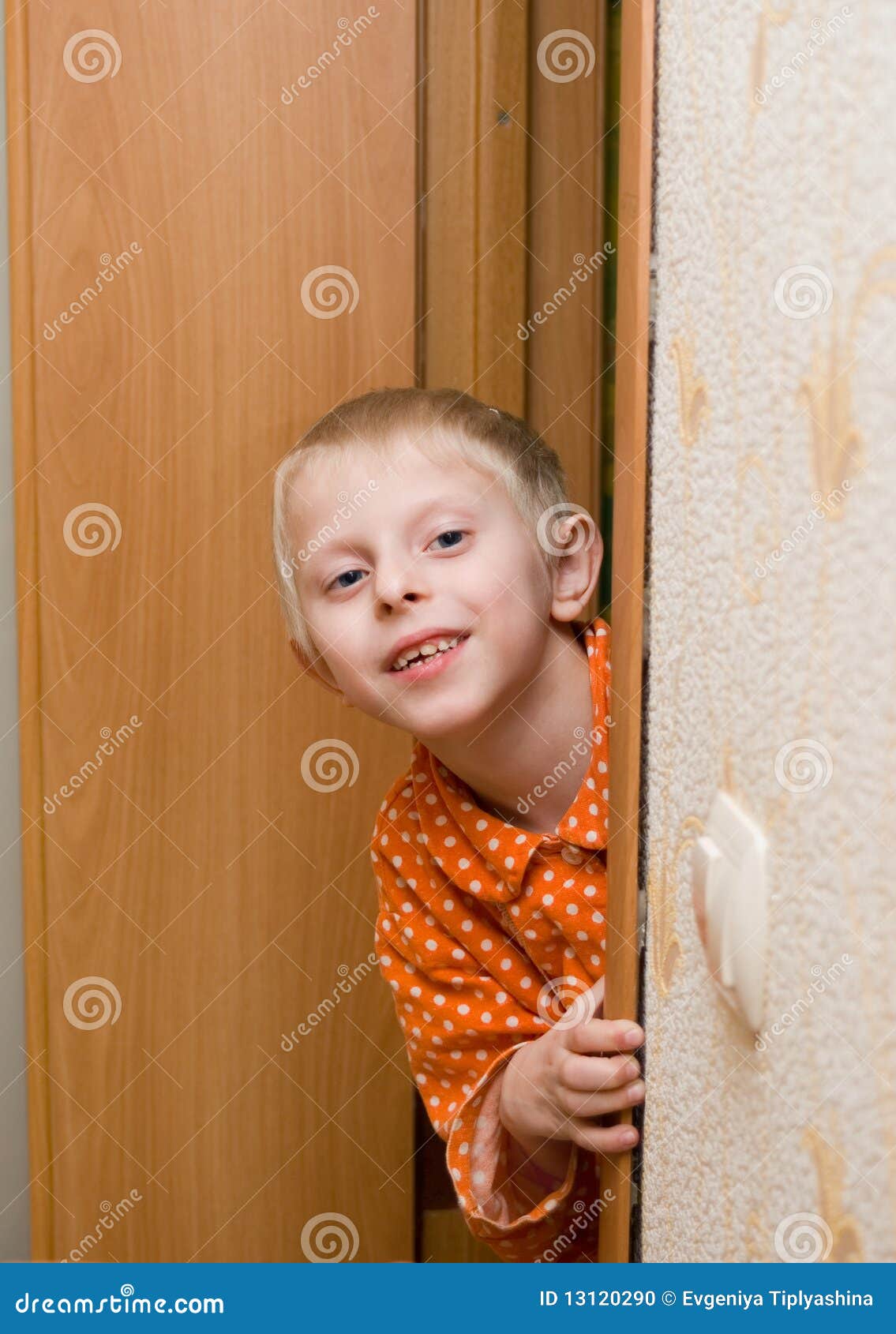 The boy looks in a room stock photo. Image of smile, cheerful - 13120290