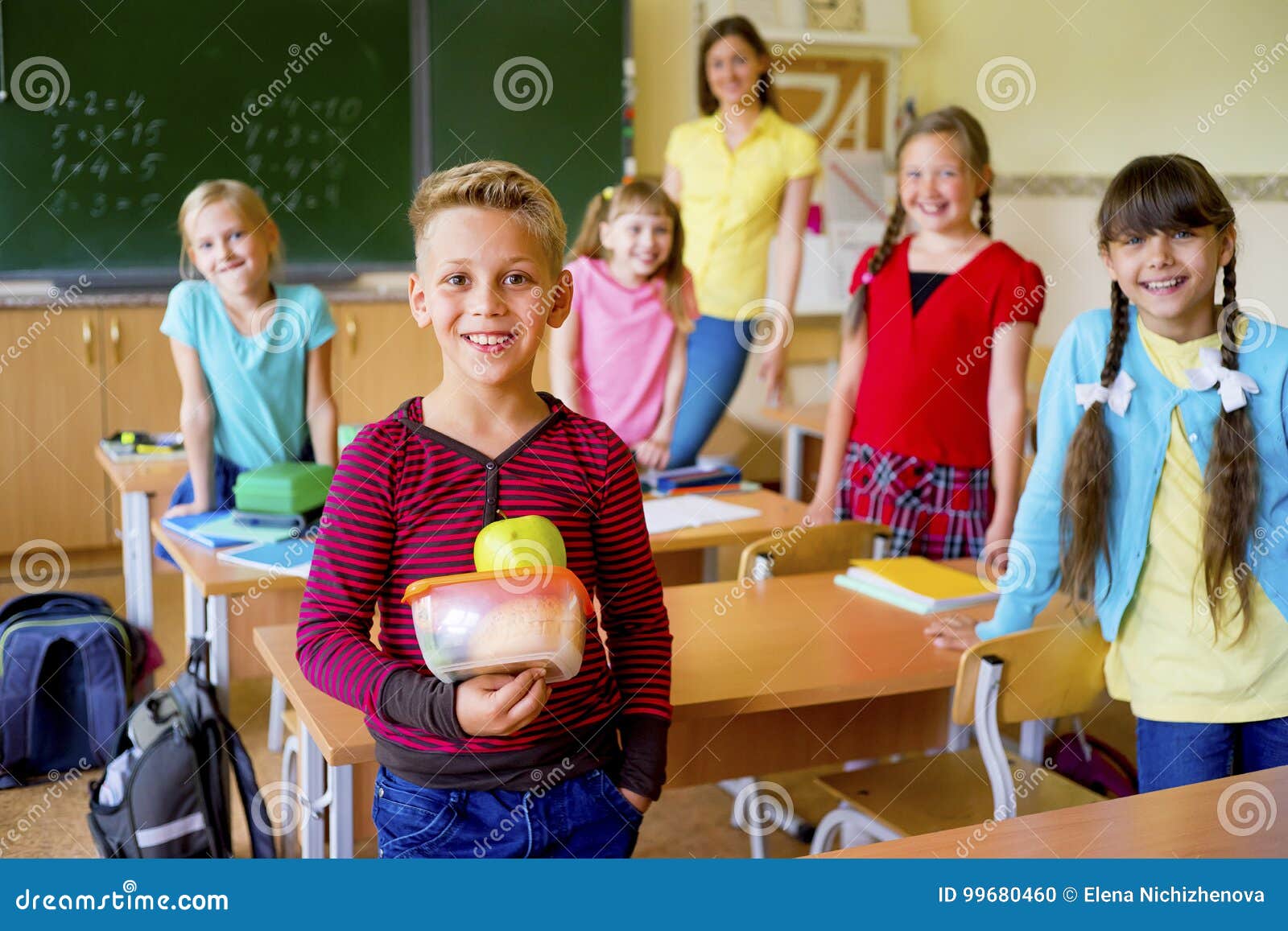 Boy with a lunchbox stock photo. Image of outdoors, education - 99680460